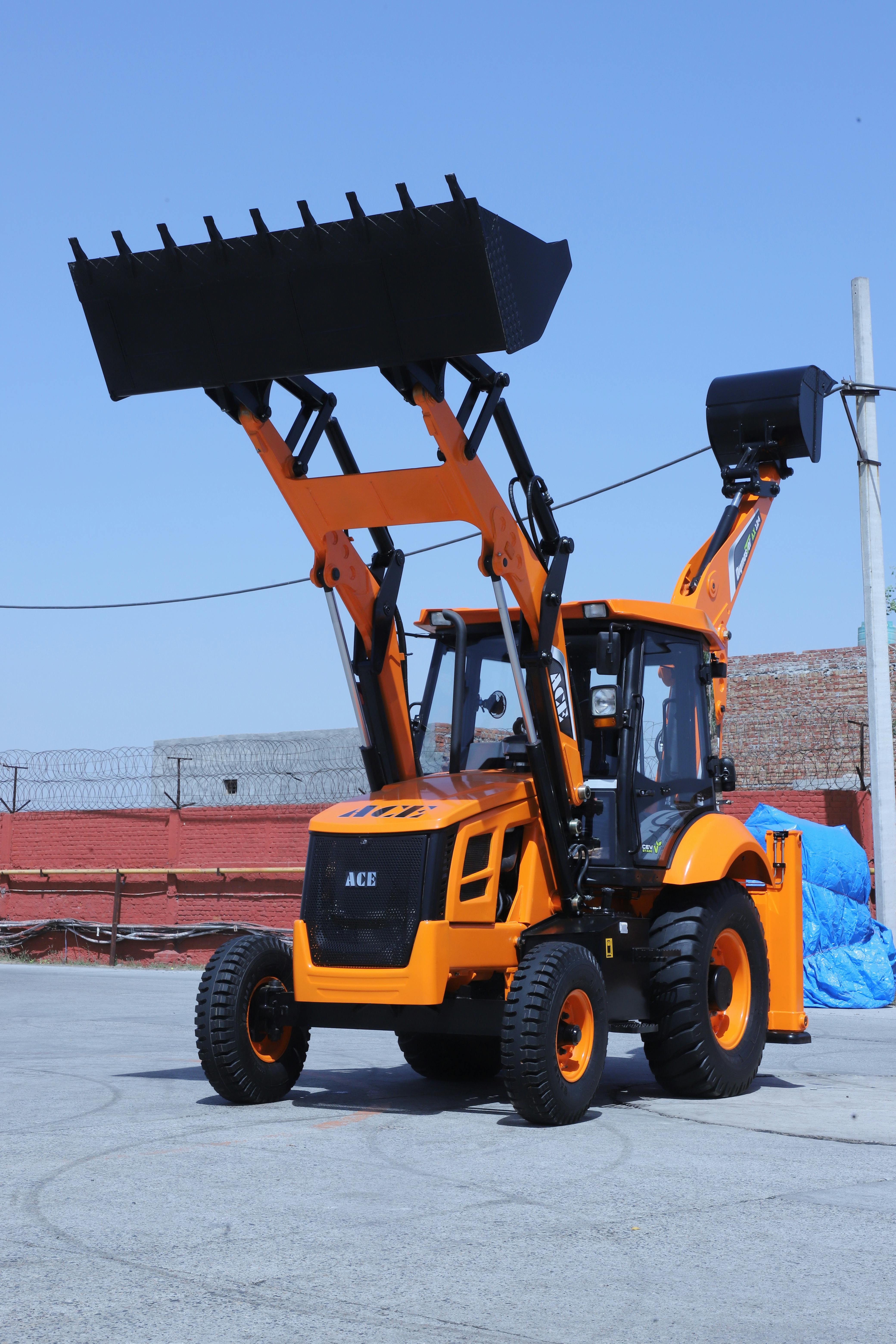 ACE AX 124 Backhoe Loader on Display Outdoors · Free Stock Photo