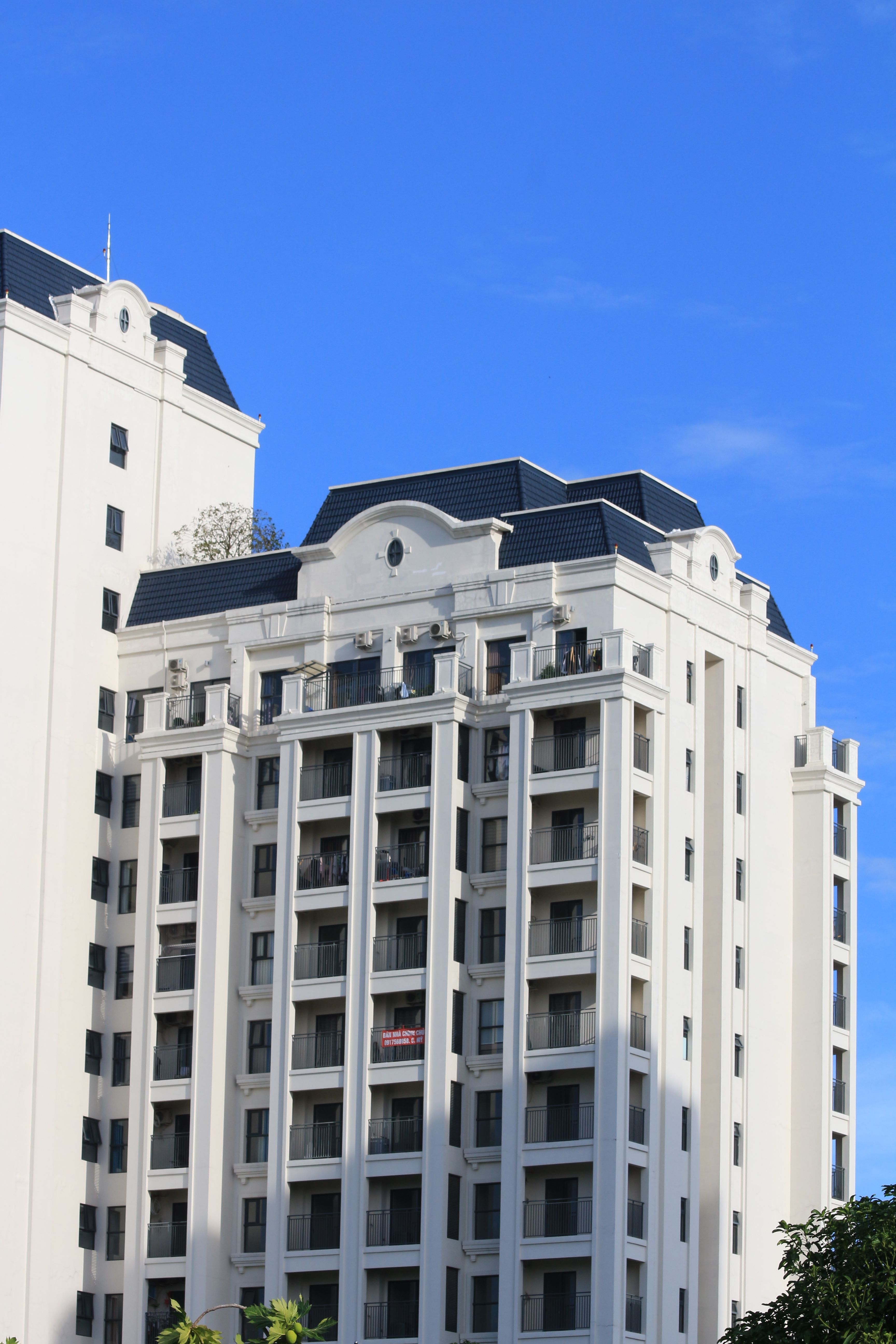 Elegant Residential Building in Blue Sky · Free Stock Photo