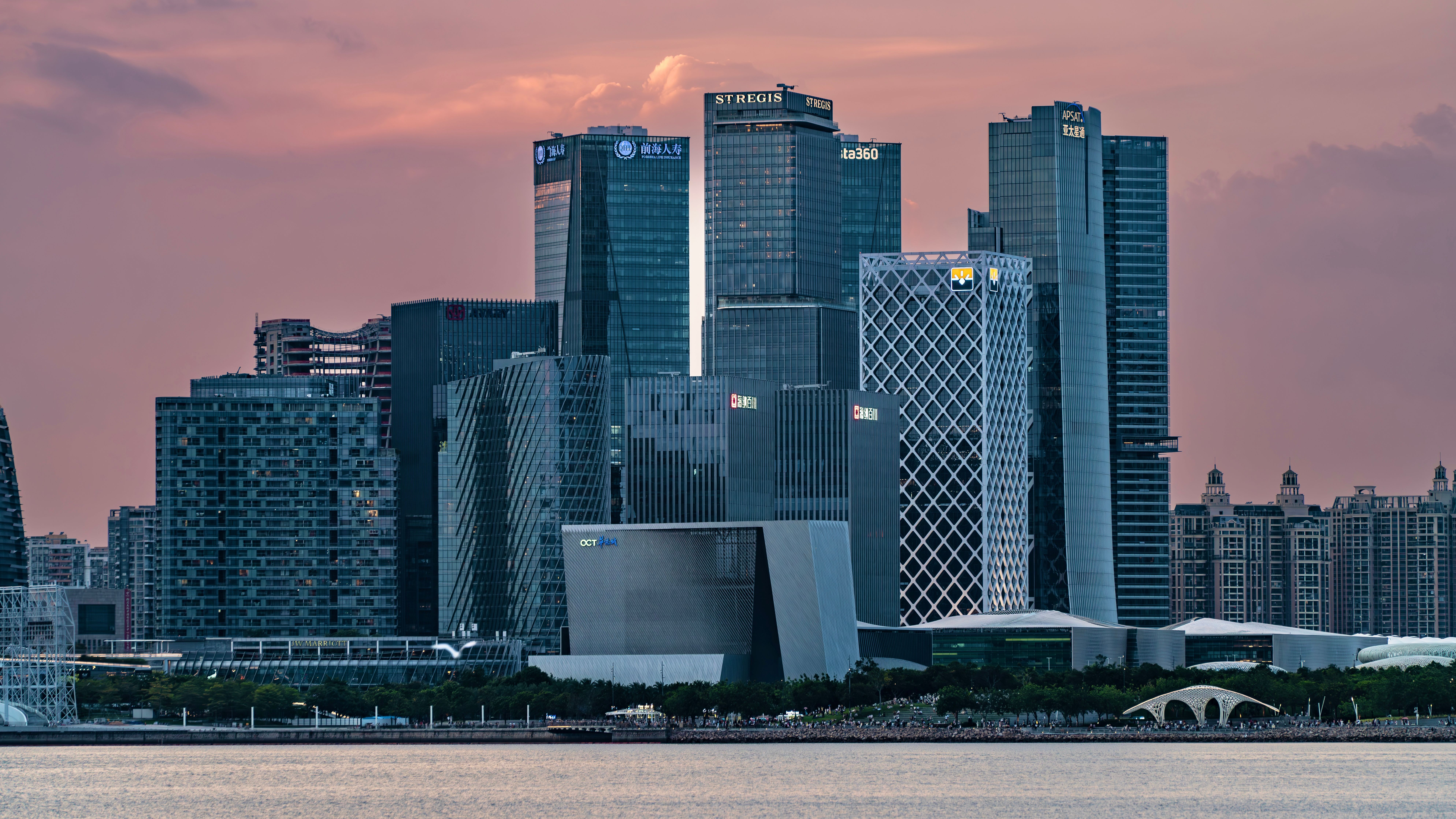 Modern City Skyline at Sunset · Free Stock Photo