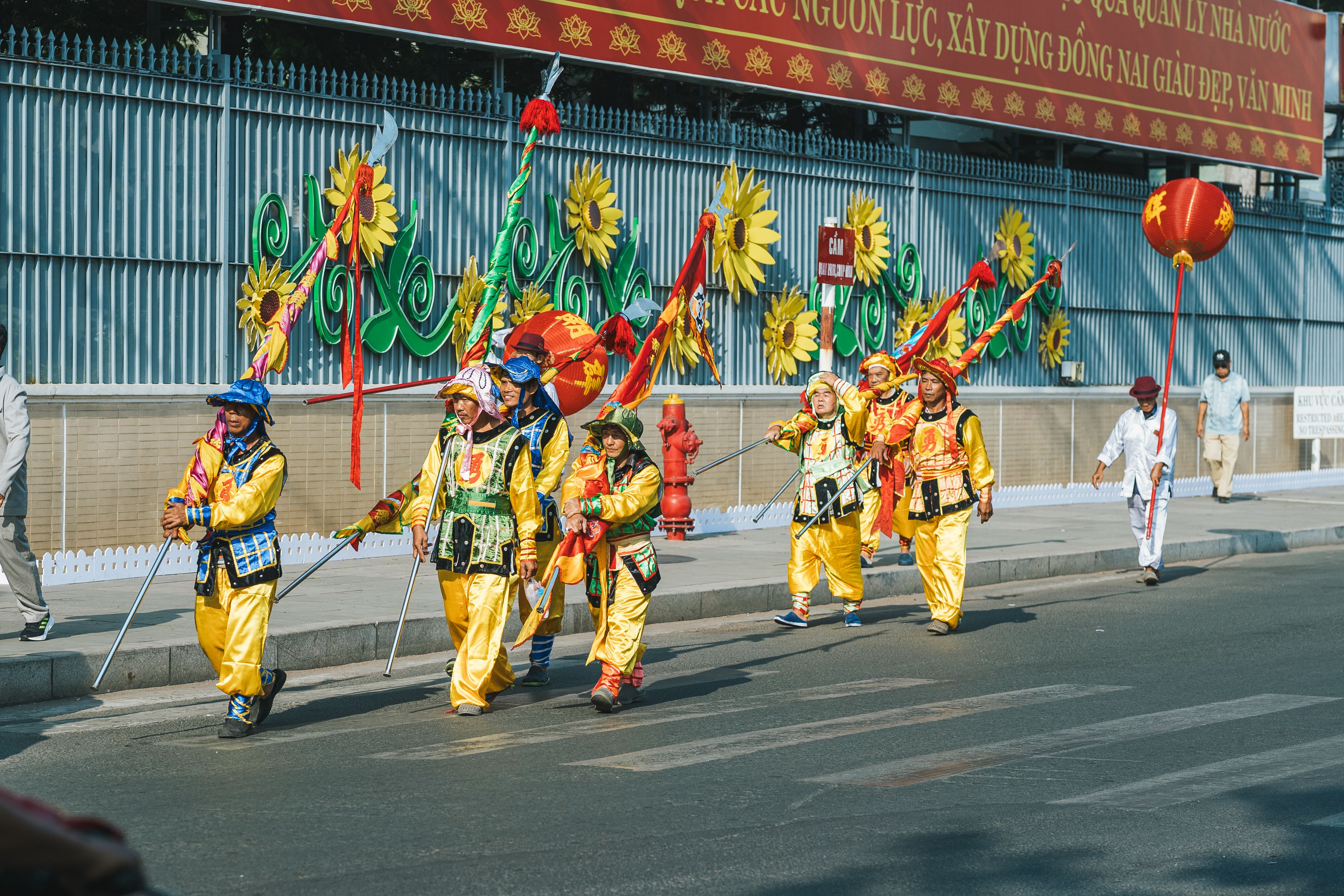 Colorful Parade with Traditional Costumes on Street · Free Stock Photo