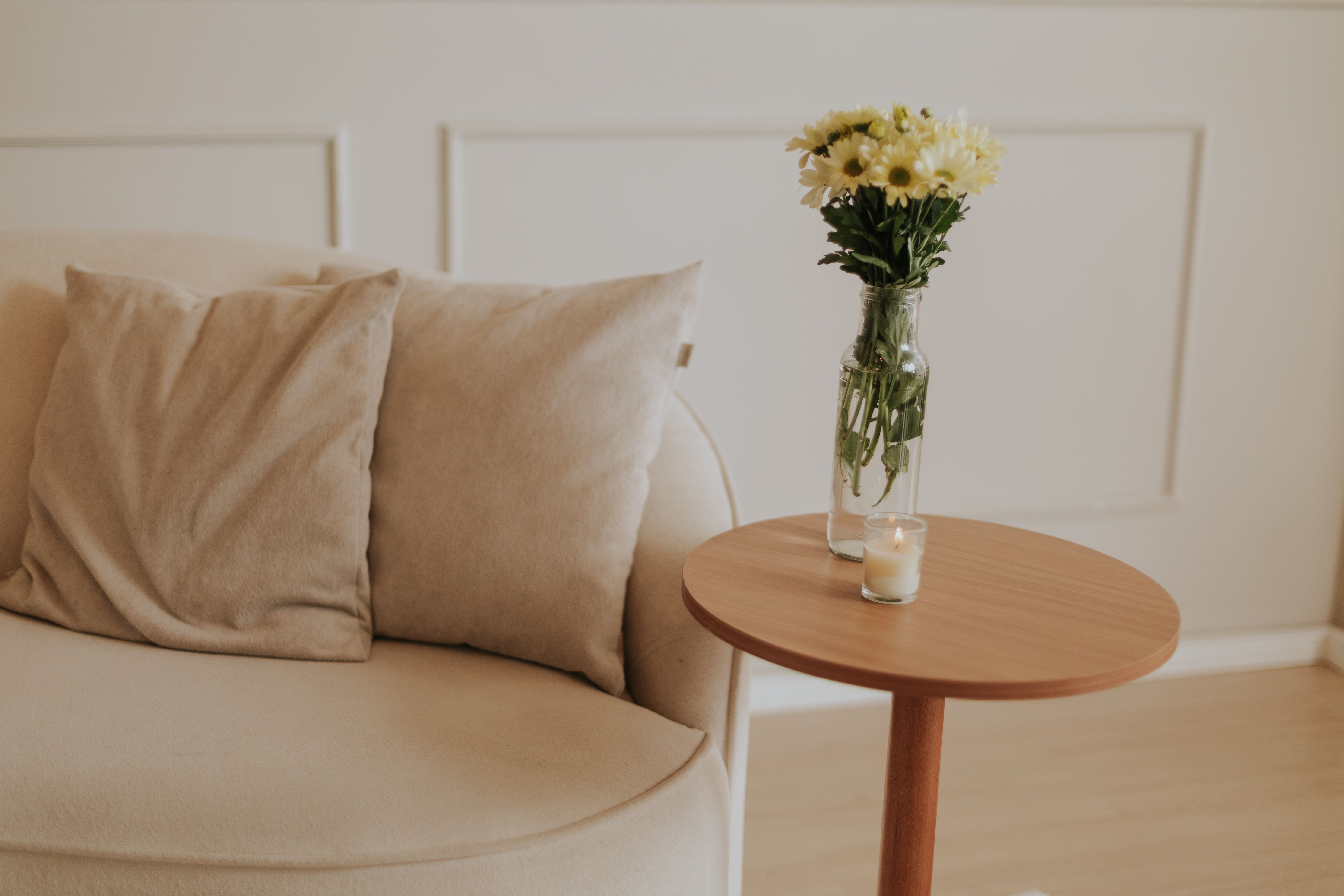 Minimalist Beige Living Room with Flowers · Free Stock Photo
