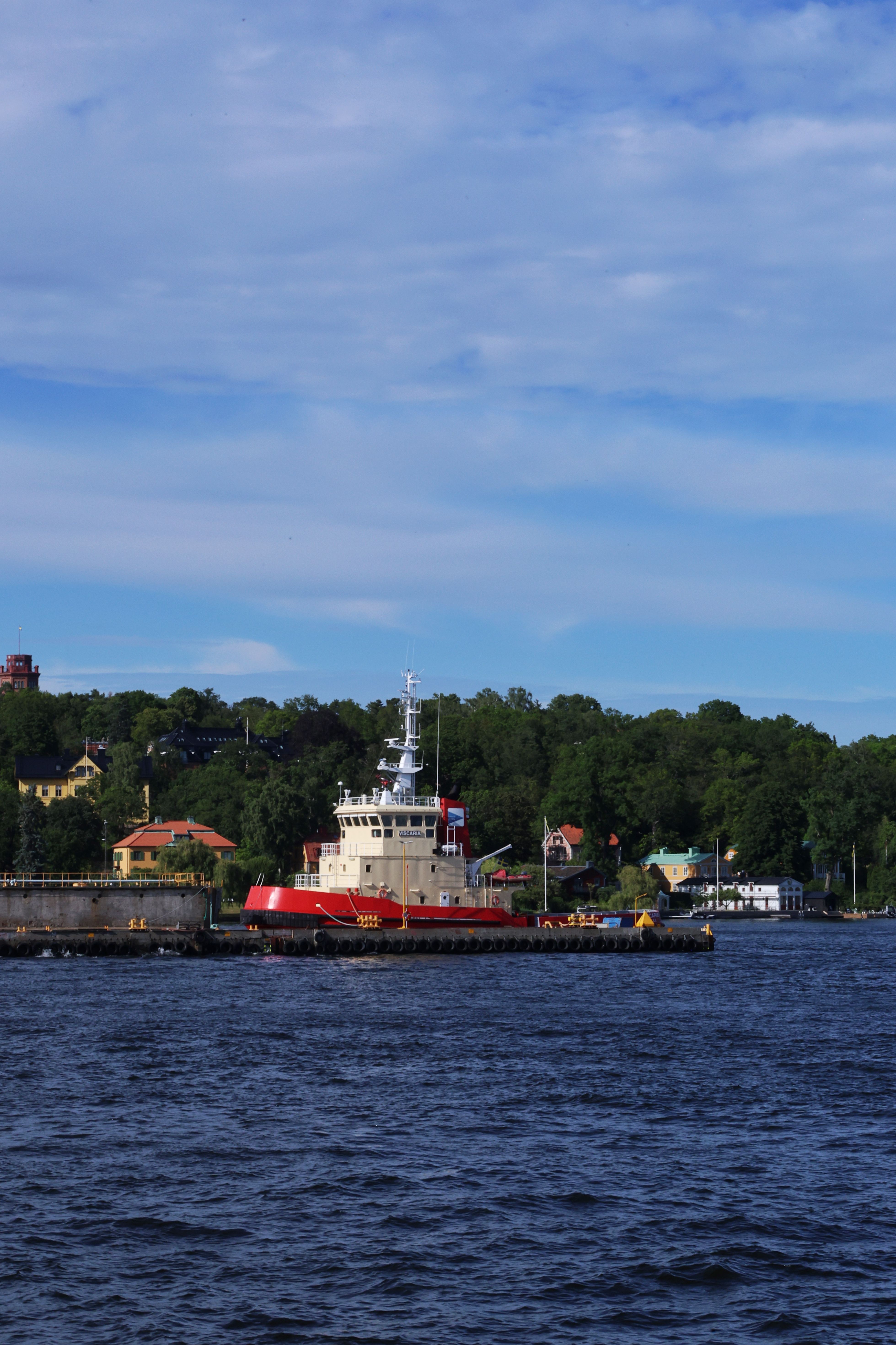 Colorful Tugboat in Stockholm Harbor · Free Stock Photo