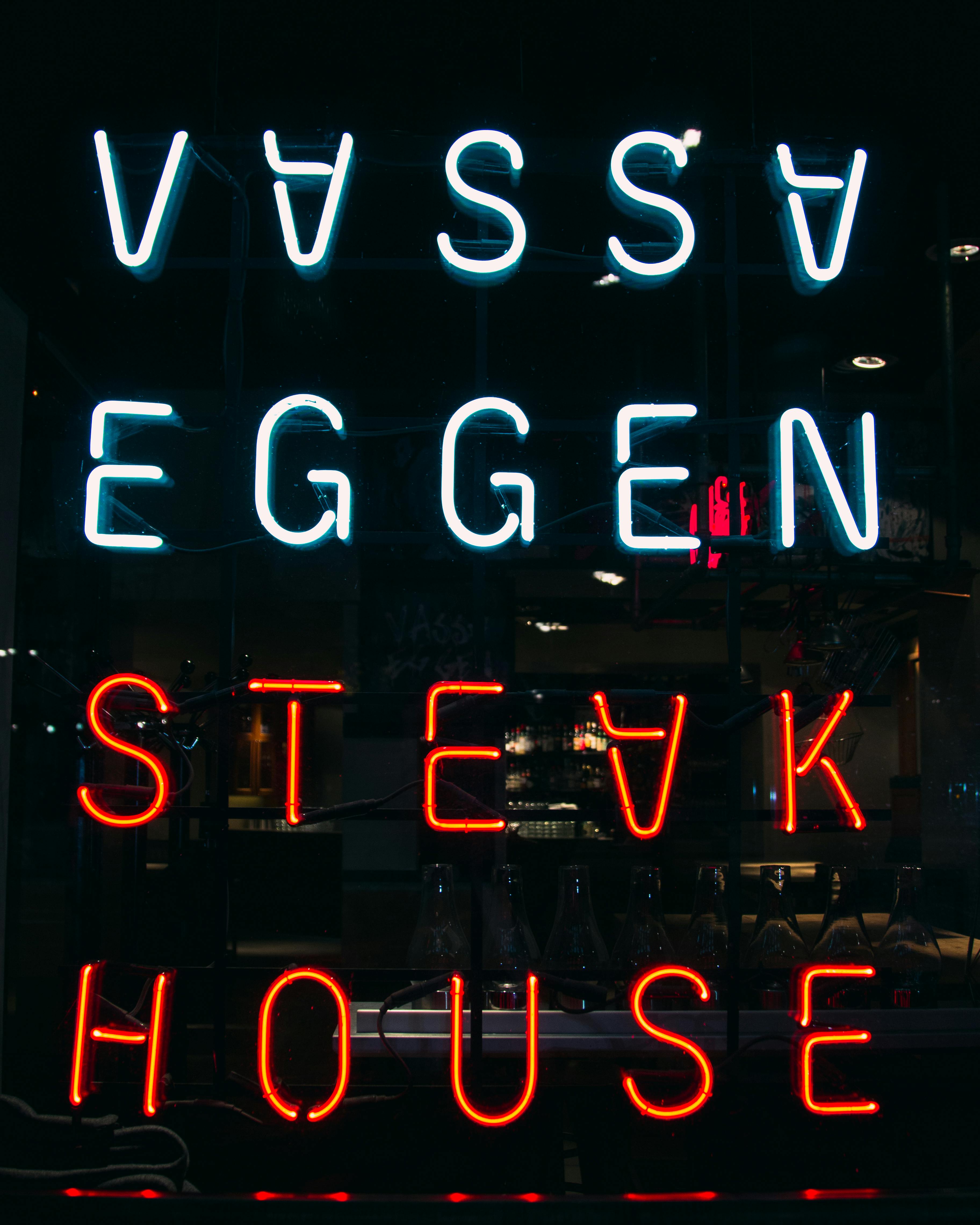Neon Light Sign on the Side of a Building · Free Stock Photo