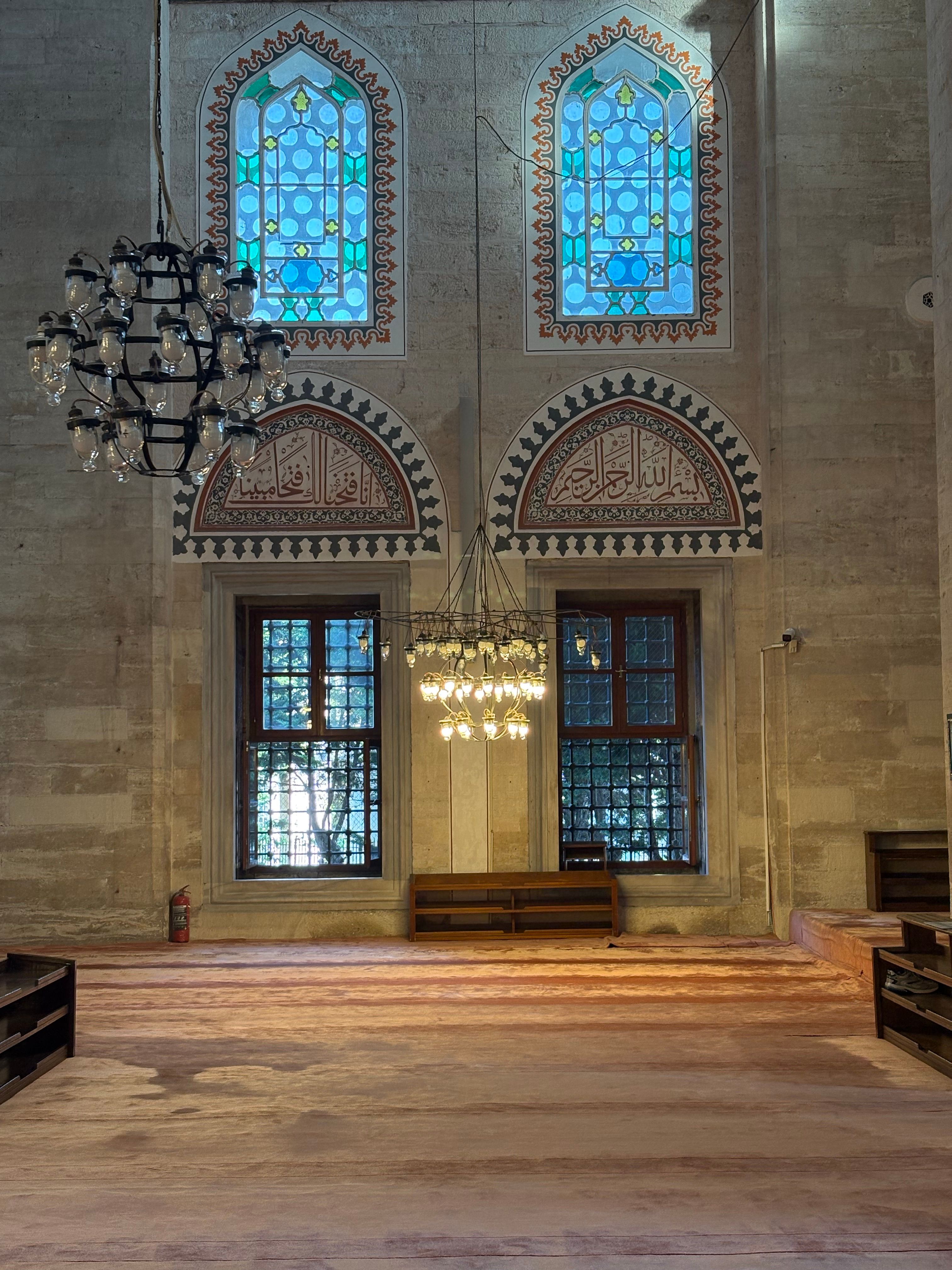 Historic Mosque Interior with Stained Glass · Free Stock Photo