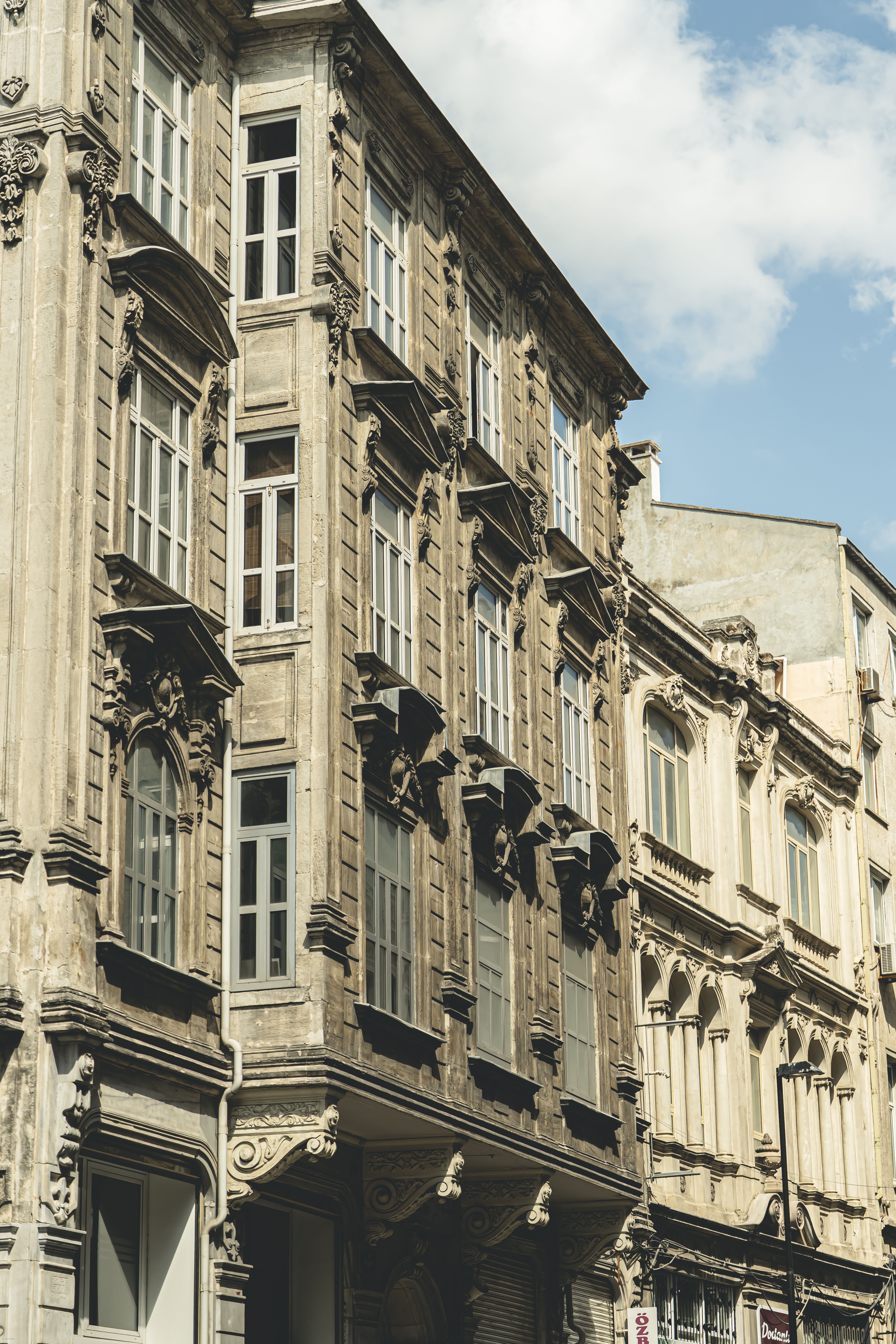 Historic European Architecture in Sunlit Street · Free Stock Photo