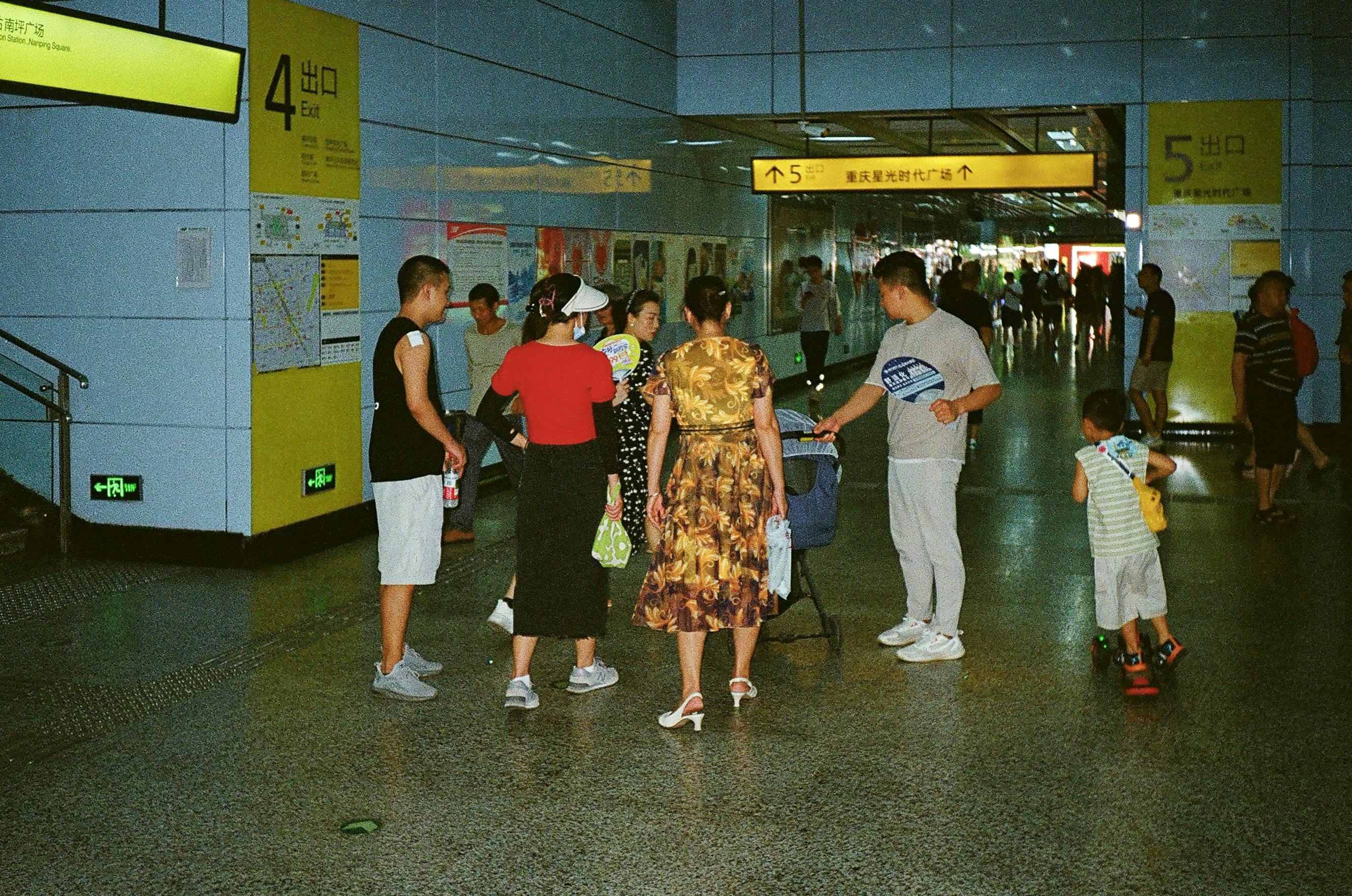 Group of People in Subway Station Lobby · Free Stock Photo