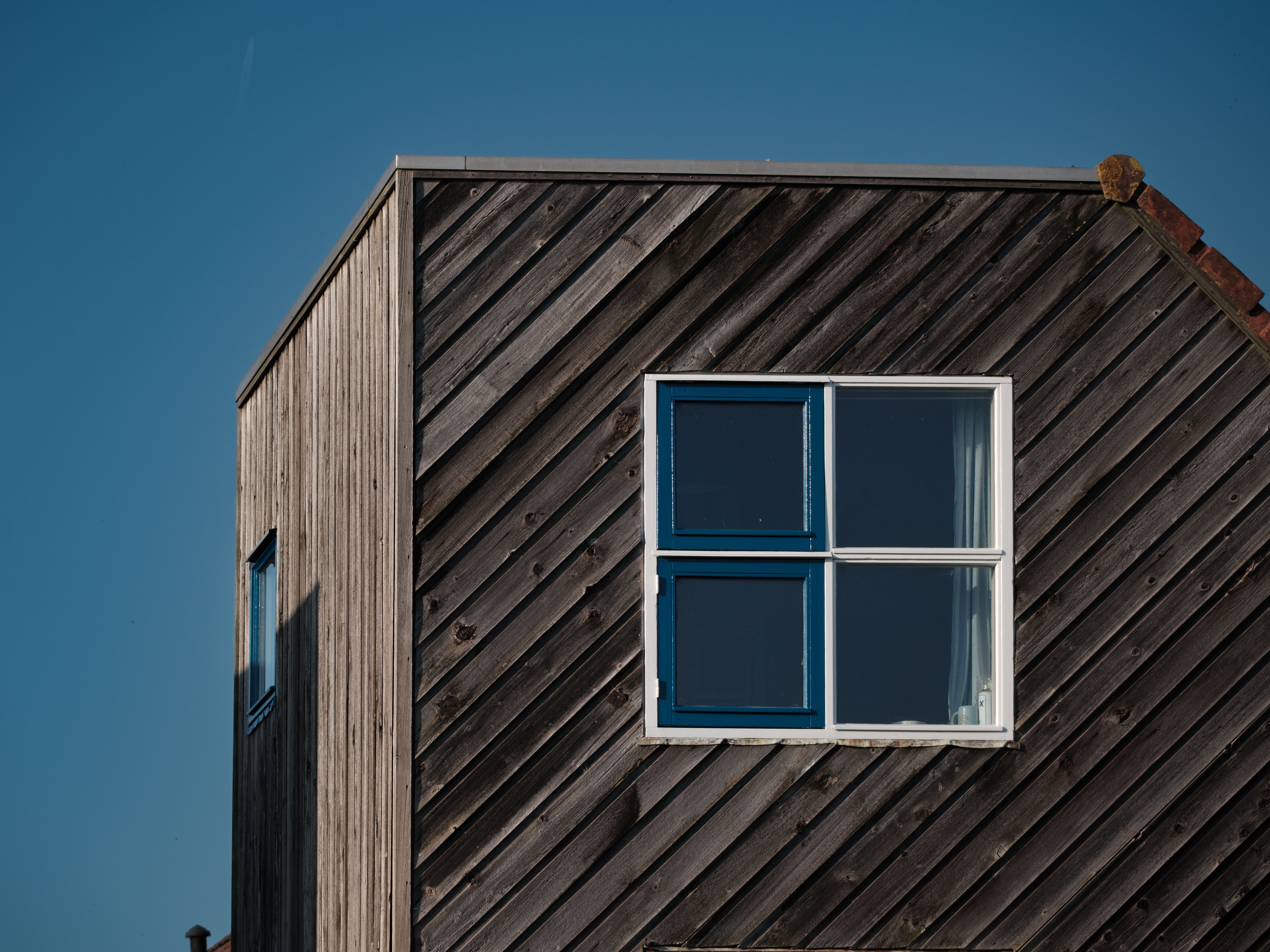 Wooden House with Contemporary Design and Blue Window · Free Stock Photo