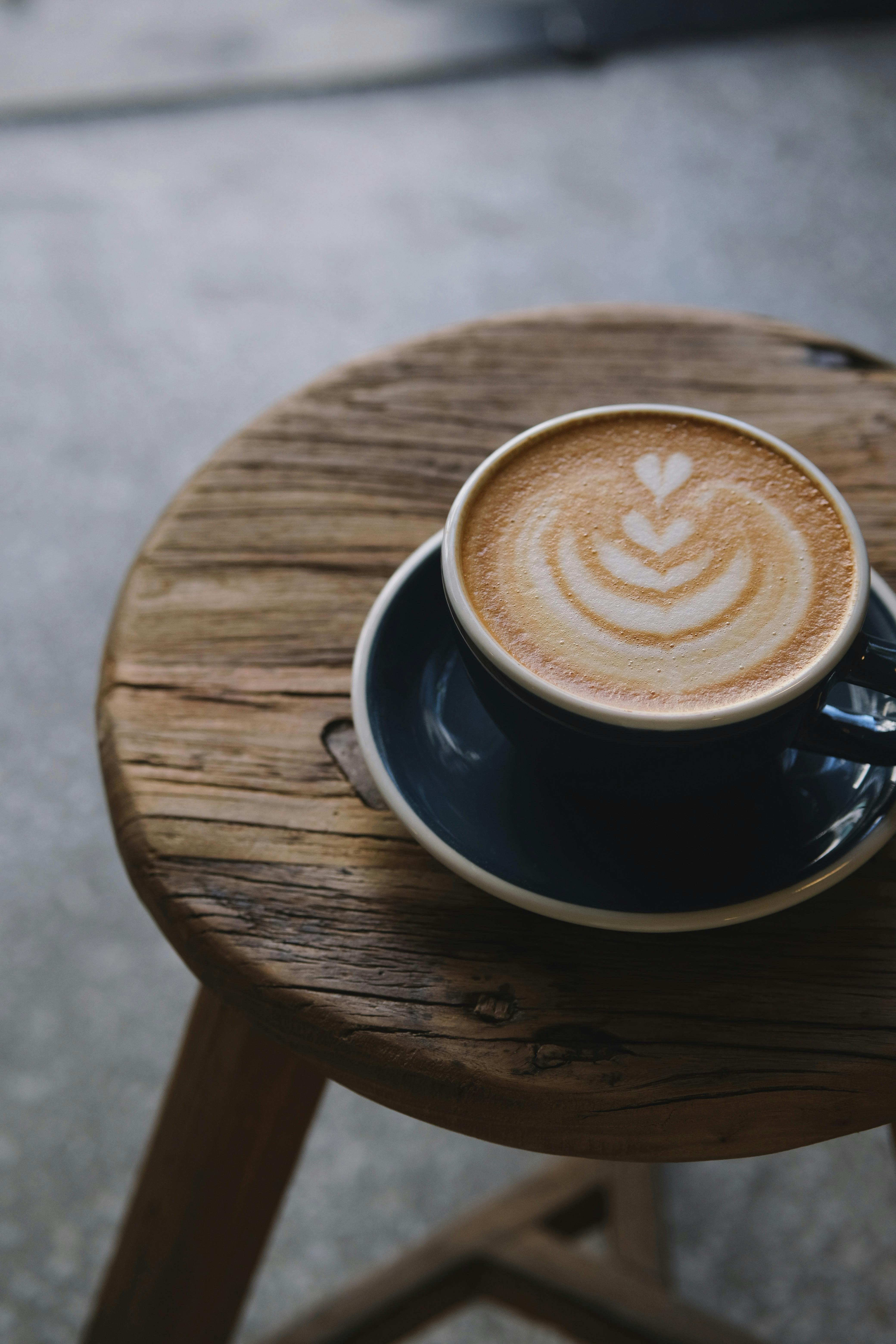 Cup Of Coffee On A Wooden Table · Free Stock Photo