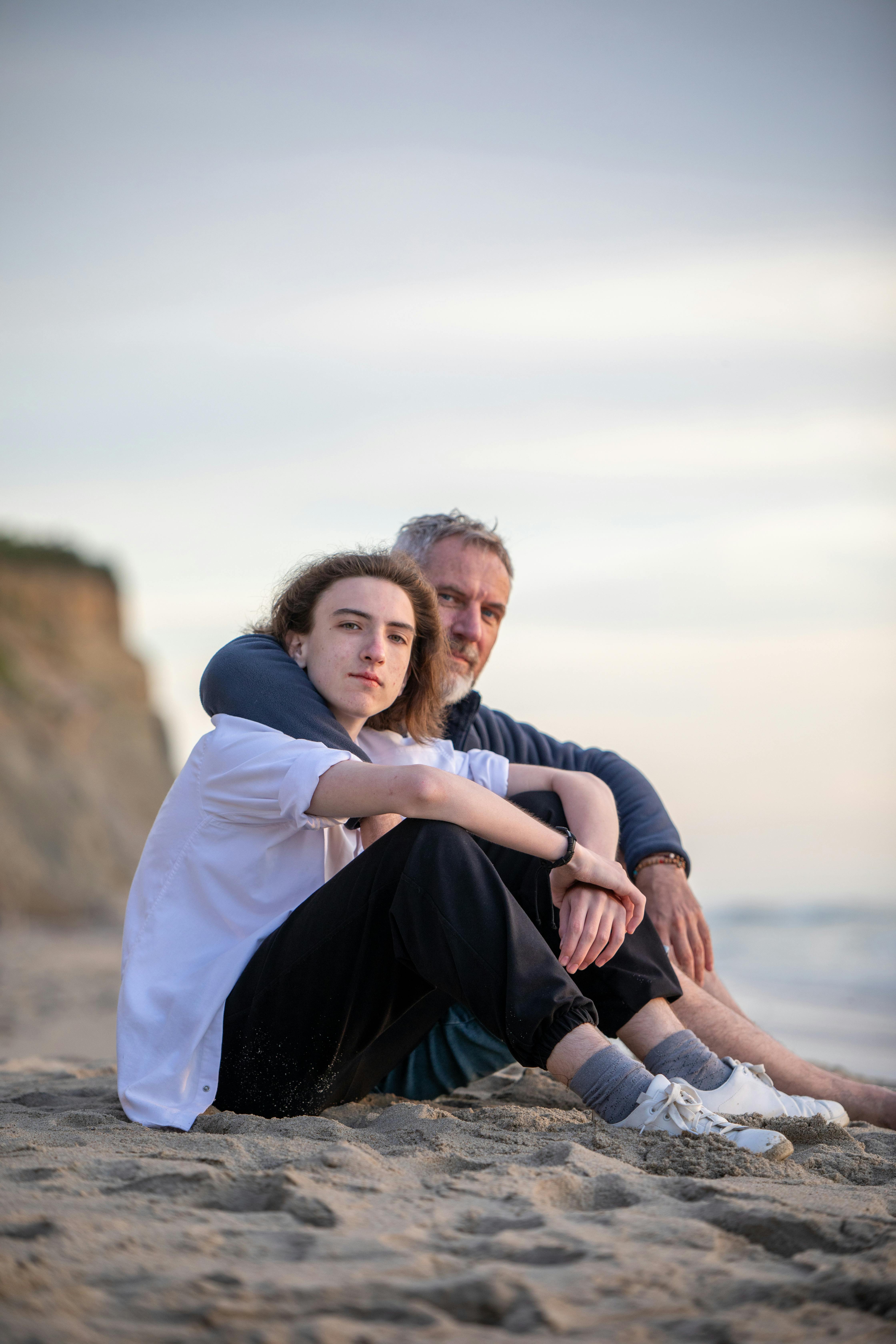Father and Son Bonding at the Beach · Free Stock Photo