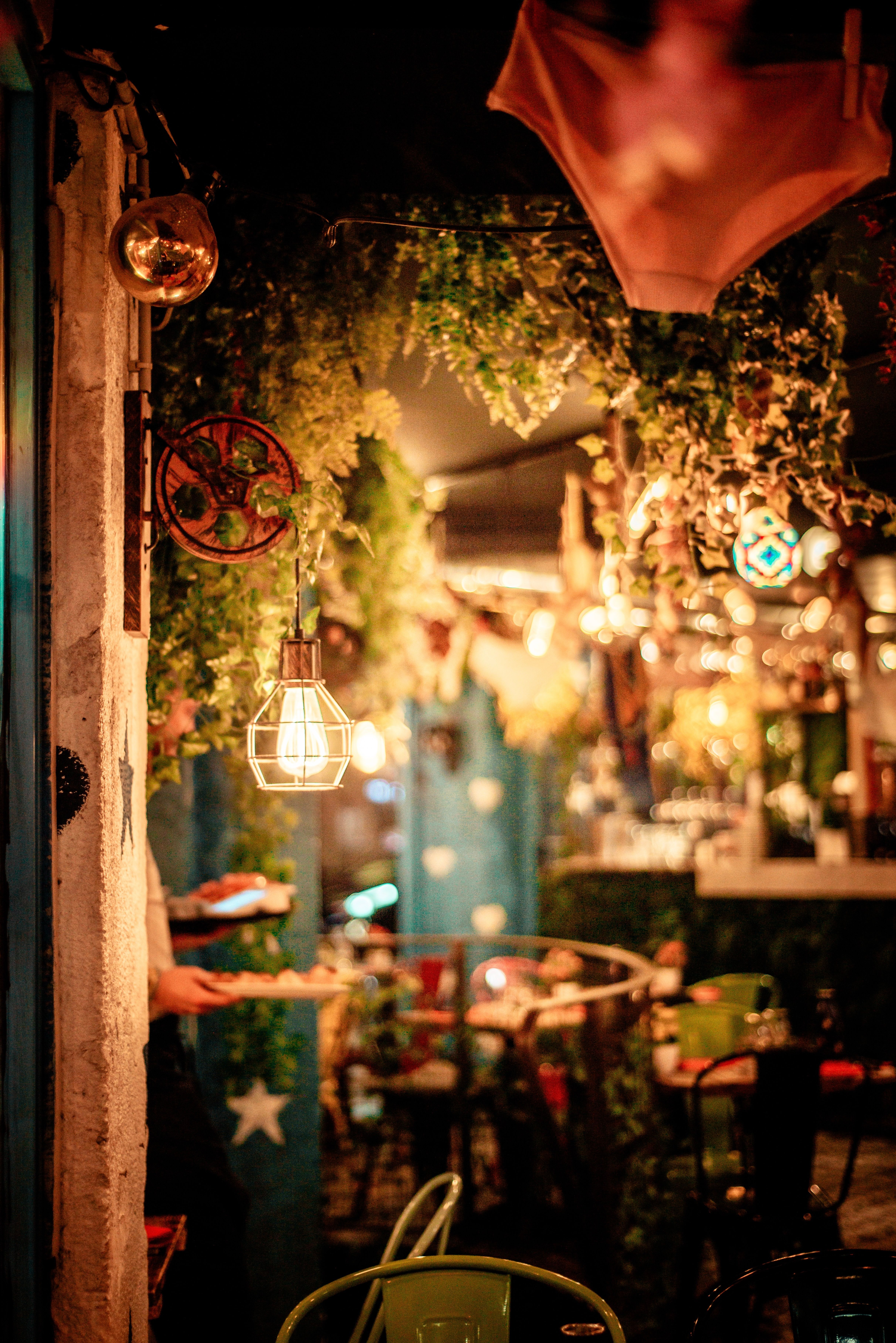 Cozy Urban Cafe with Ambient Lighting · Free Stock Photo