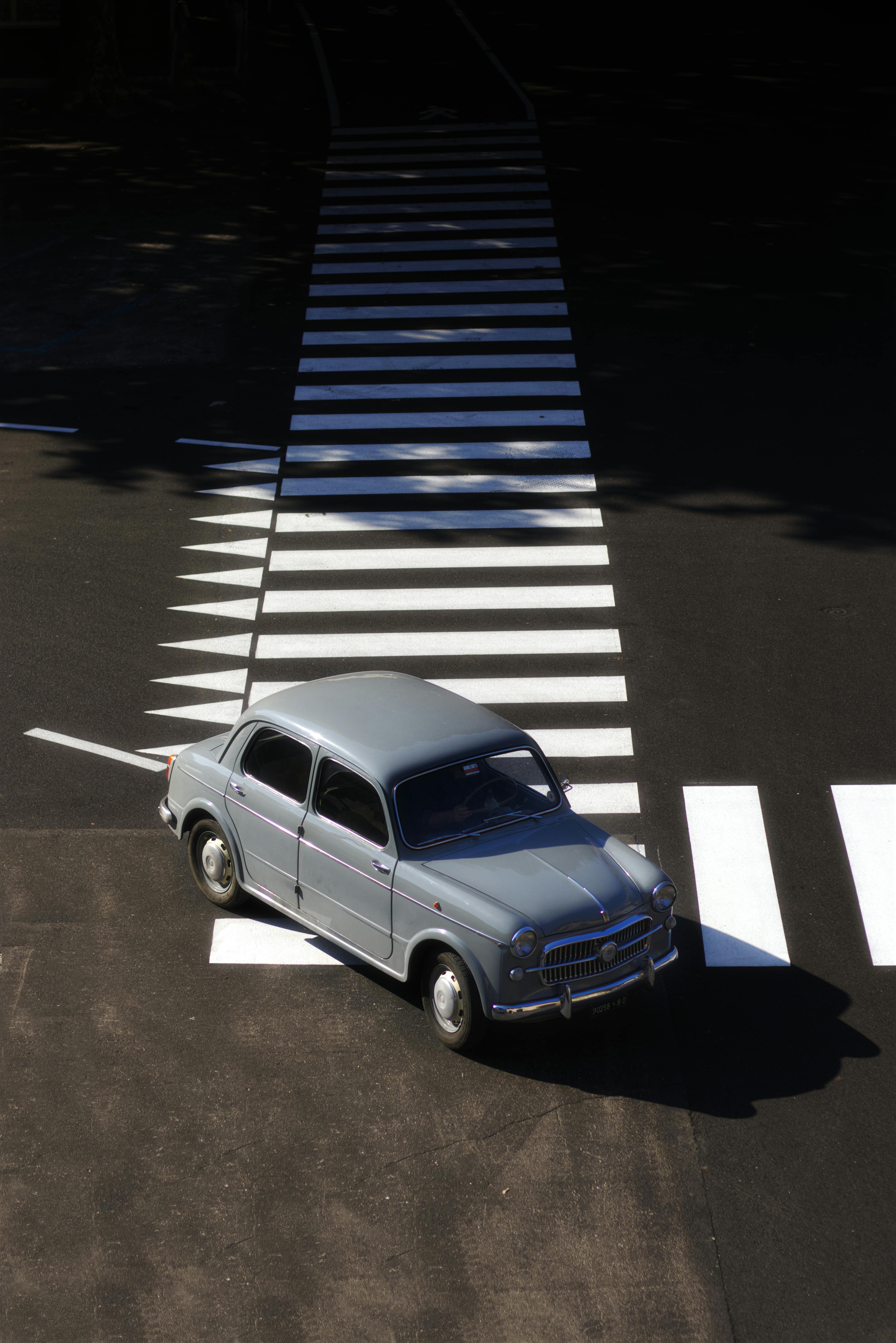 Vintage Car at Crosswalk in Lucca, Italy · Free Stock Photo