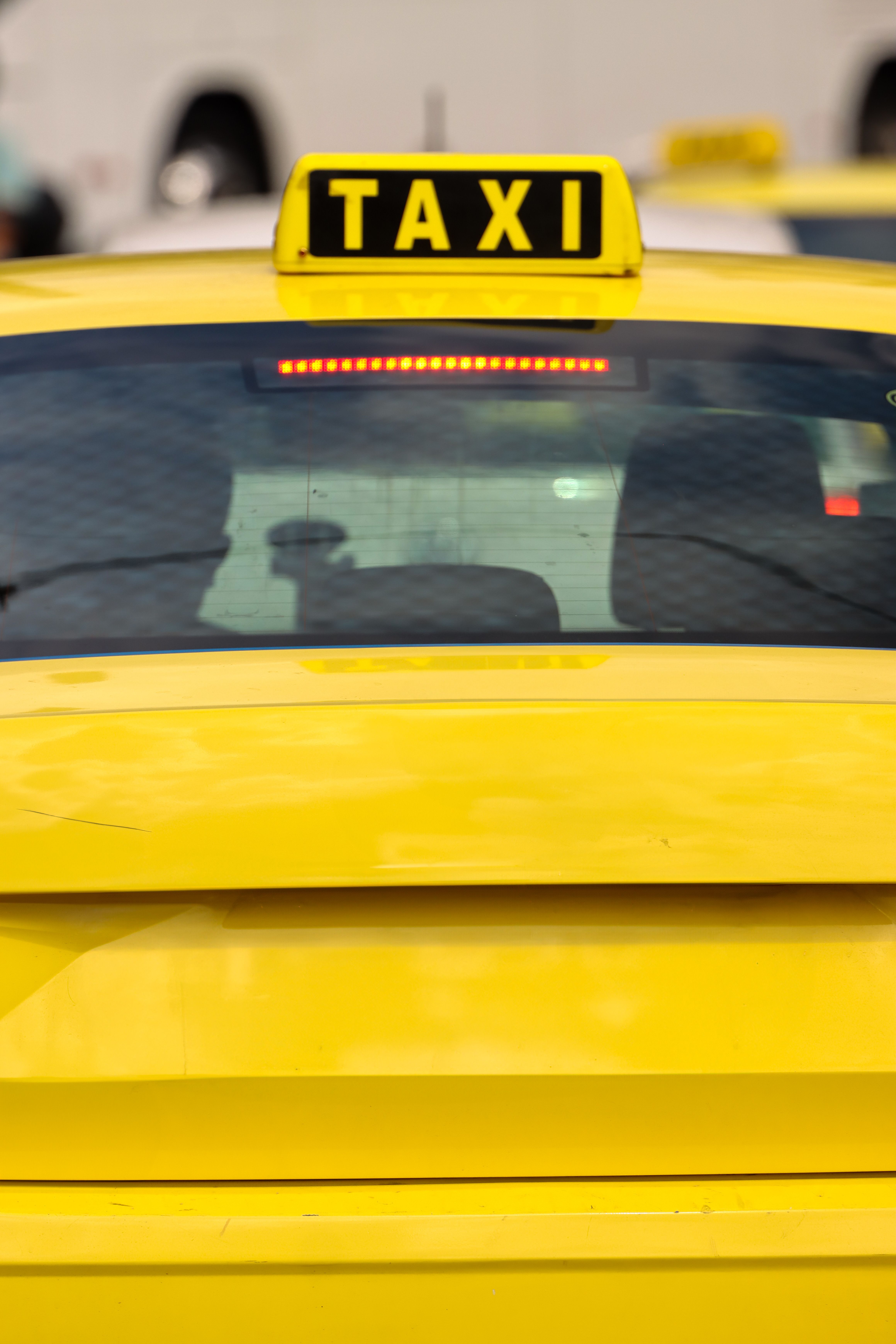 Rear View of Yellow Taxi in Athens, Greece · Free Stock Photo