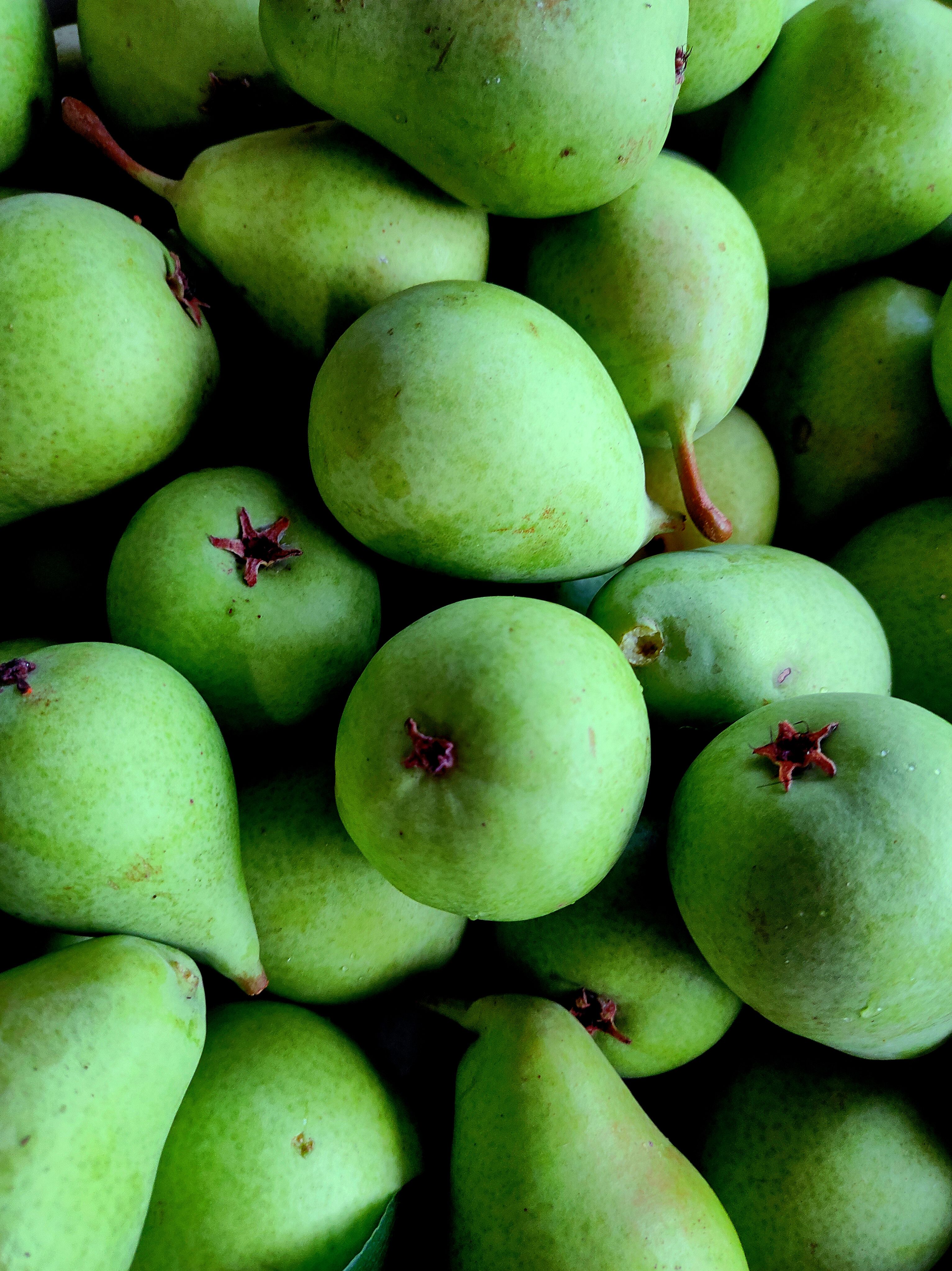 Organic Green Pears in a Market Stall · Free Stock Photo