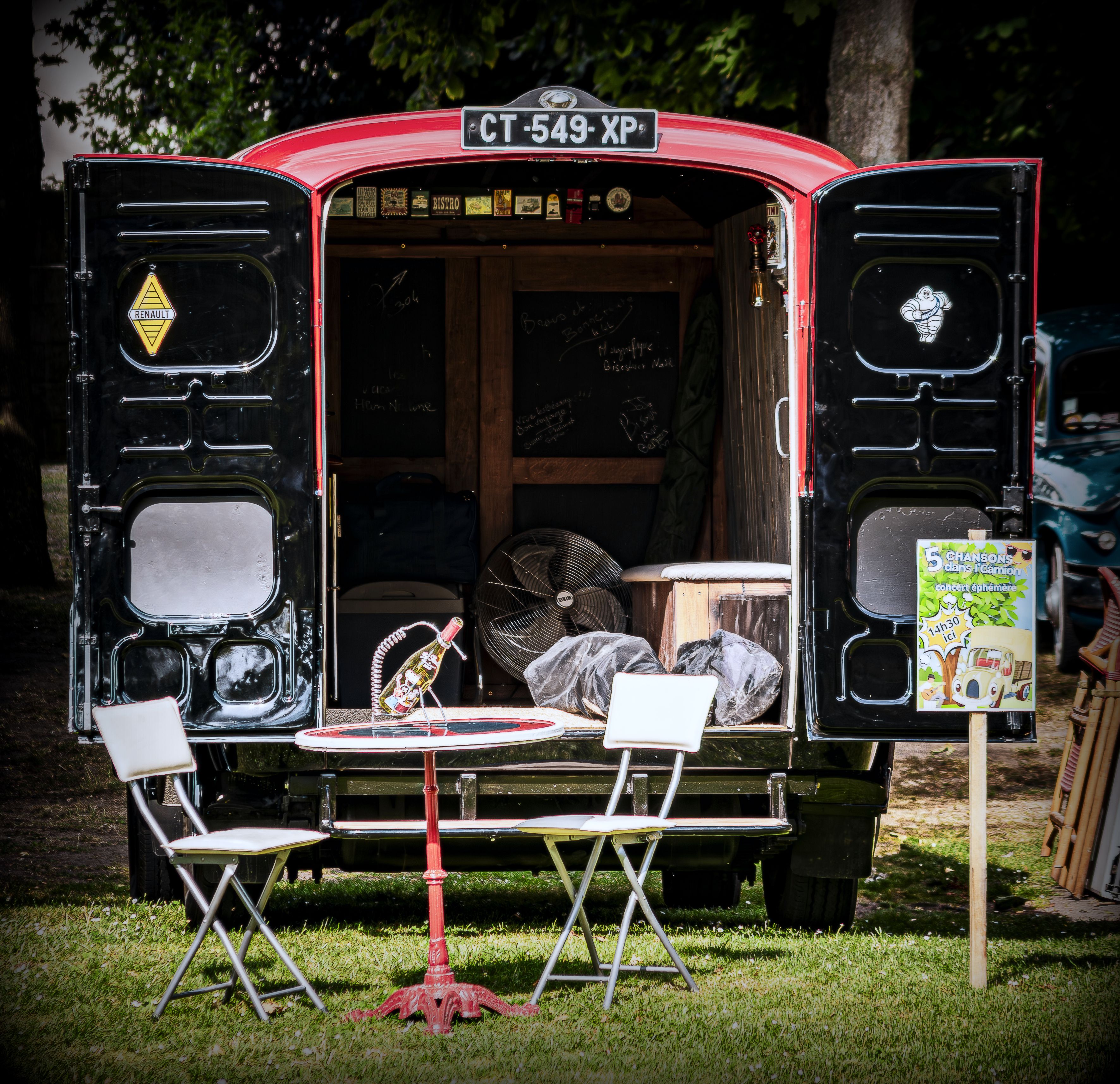 Open Vintage Van with Outdoor Seating Setup · Free Stock Photo