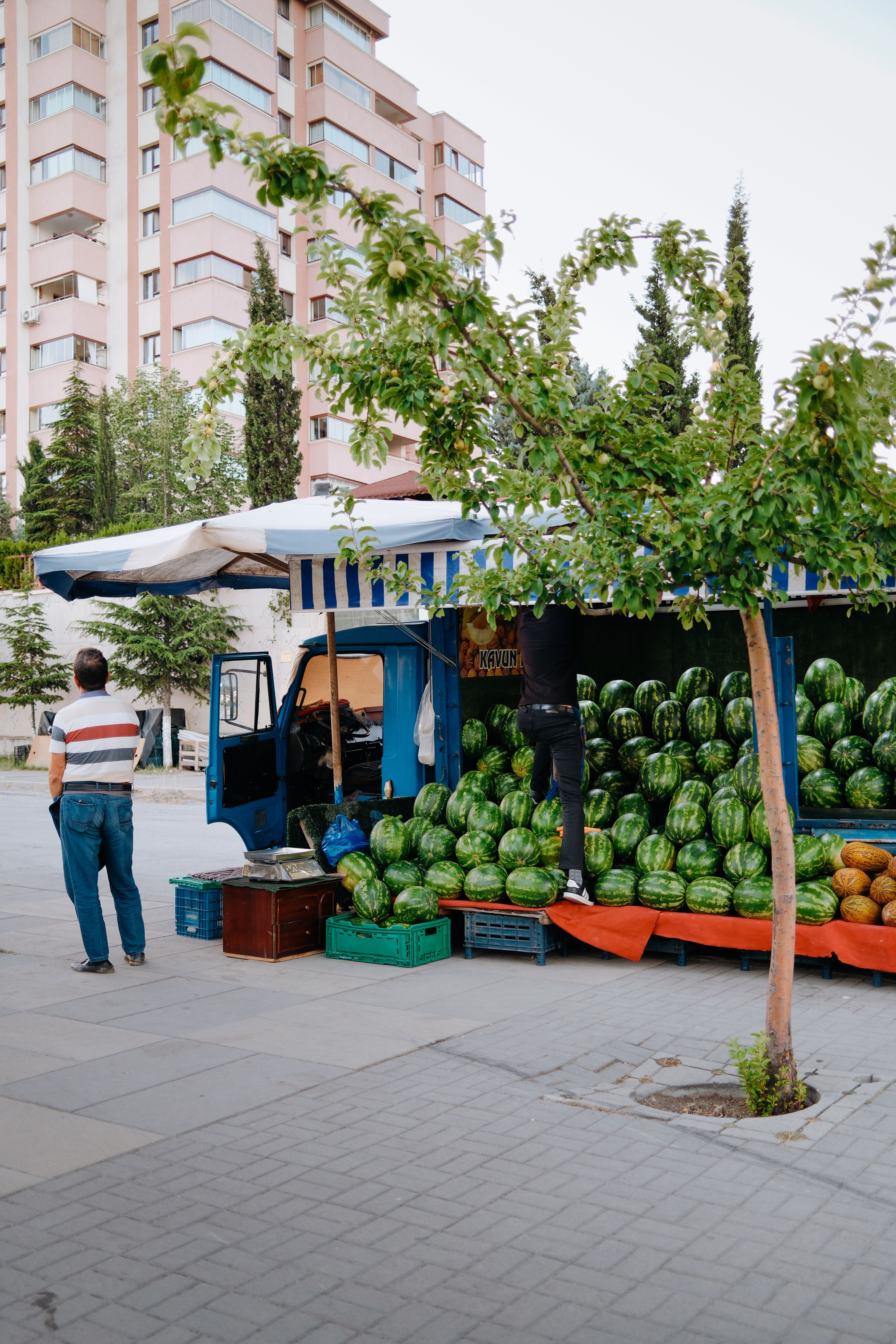 Outdoor Watermelon Street Market in Urban Area · Free Stock Photo