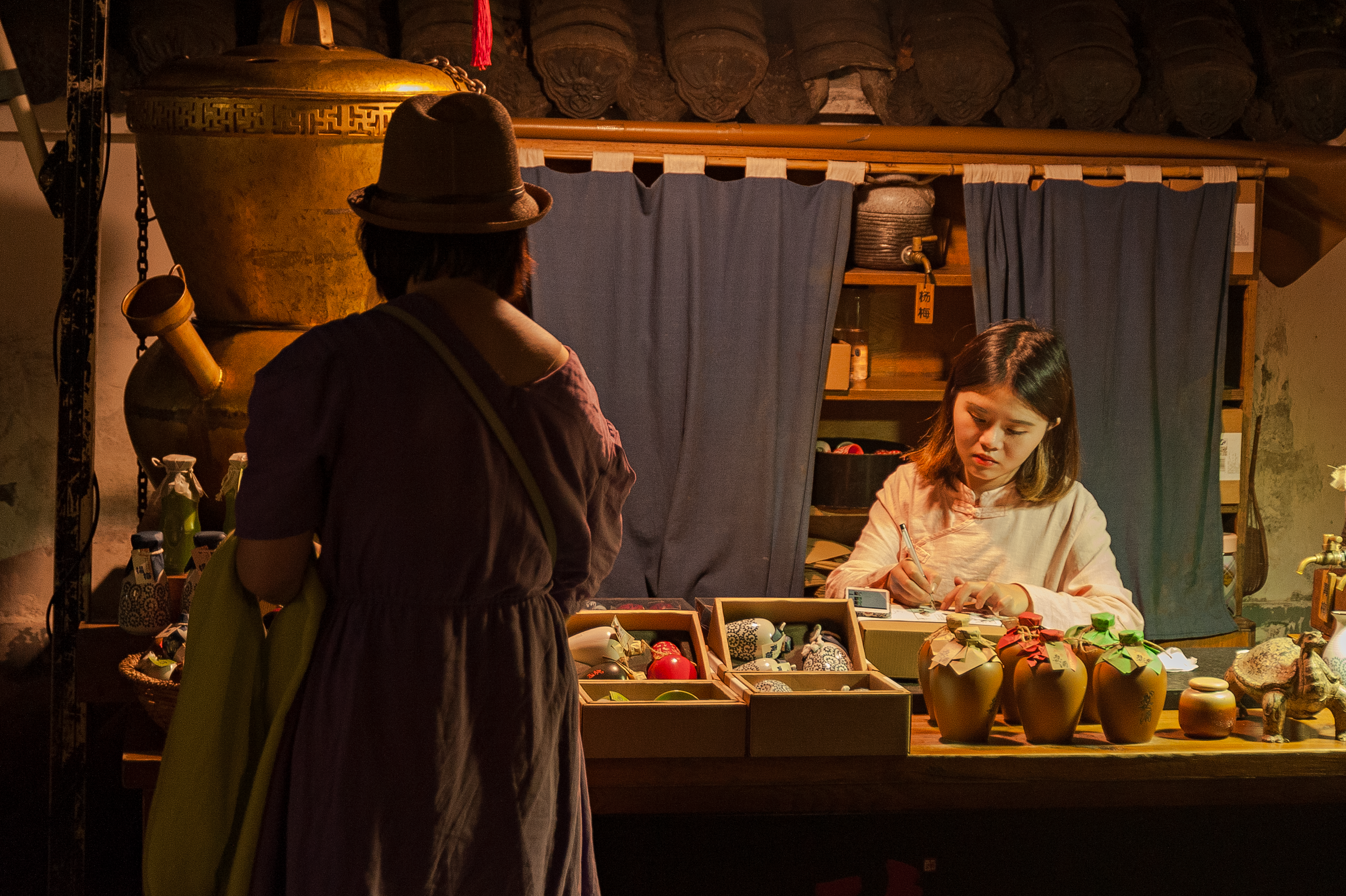 Traditional Market Stall with Crafts and Pottery · Free Stock Photo
