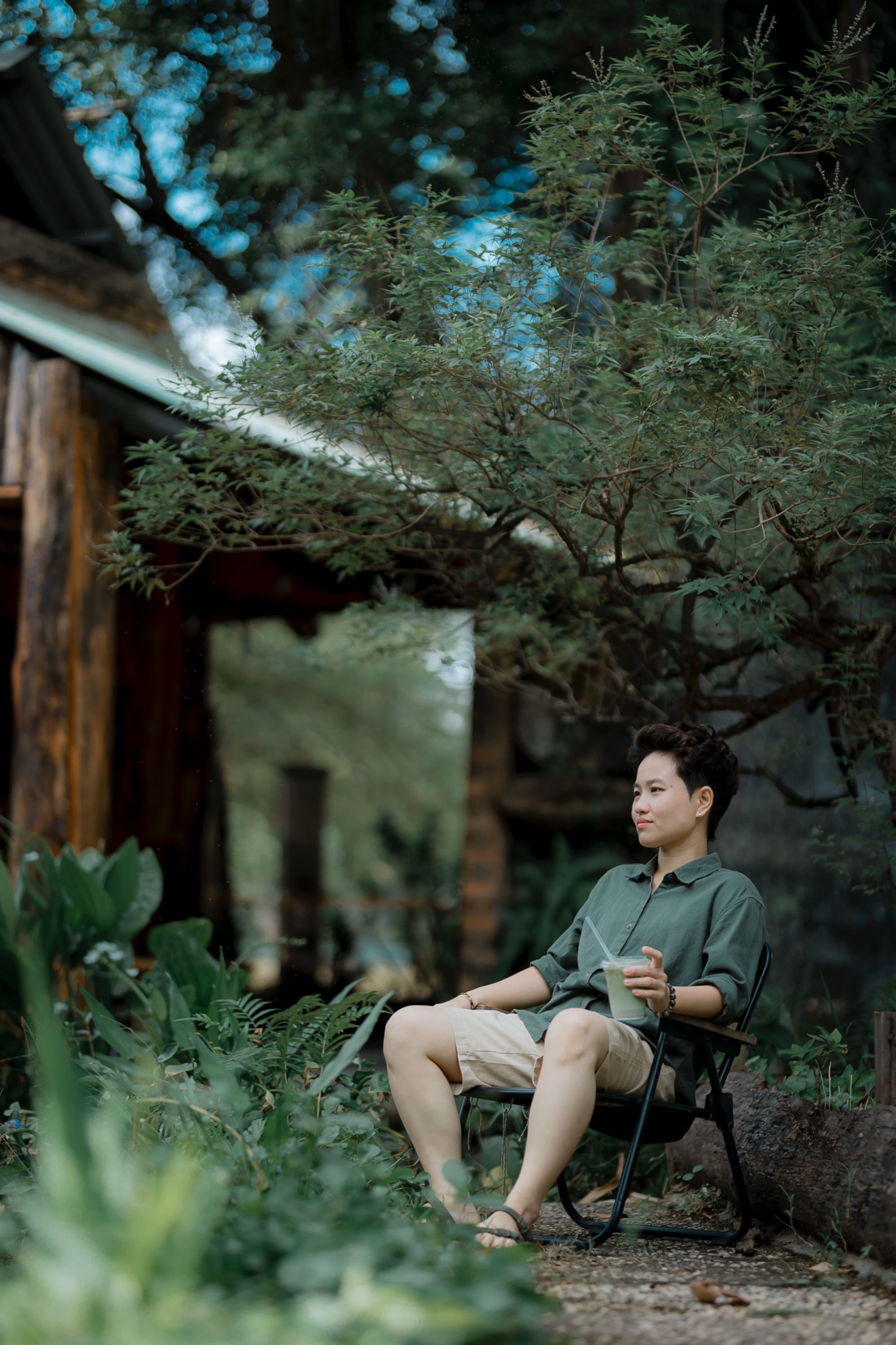 Contemplative Adult Relaxing Outdoors in Nature · Free Stock Photo