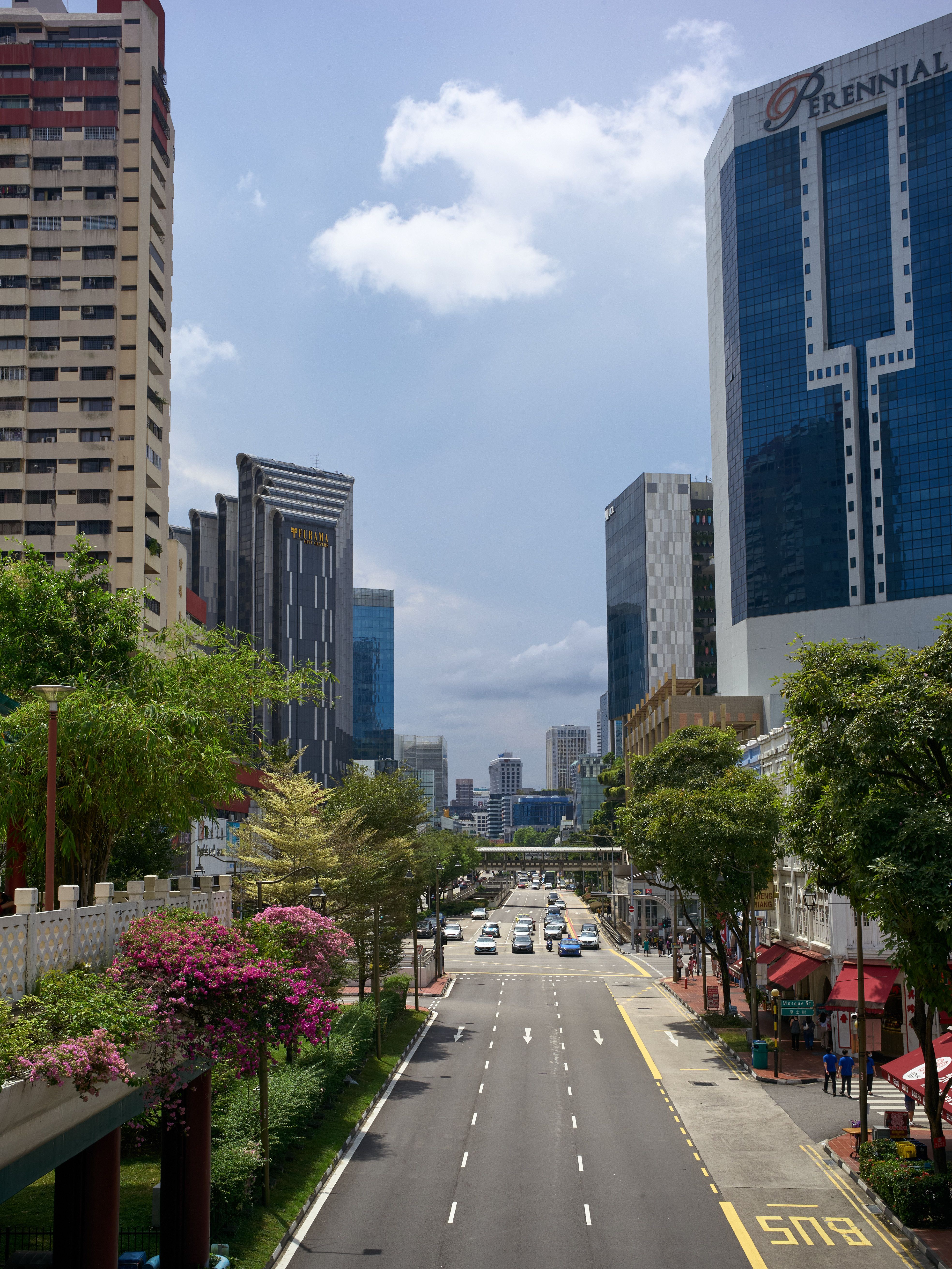 Urban Street View with Skyscrapers and Blue Sky · Free Stock Photo
