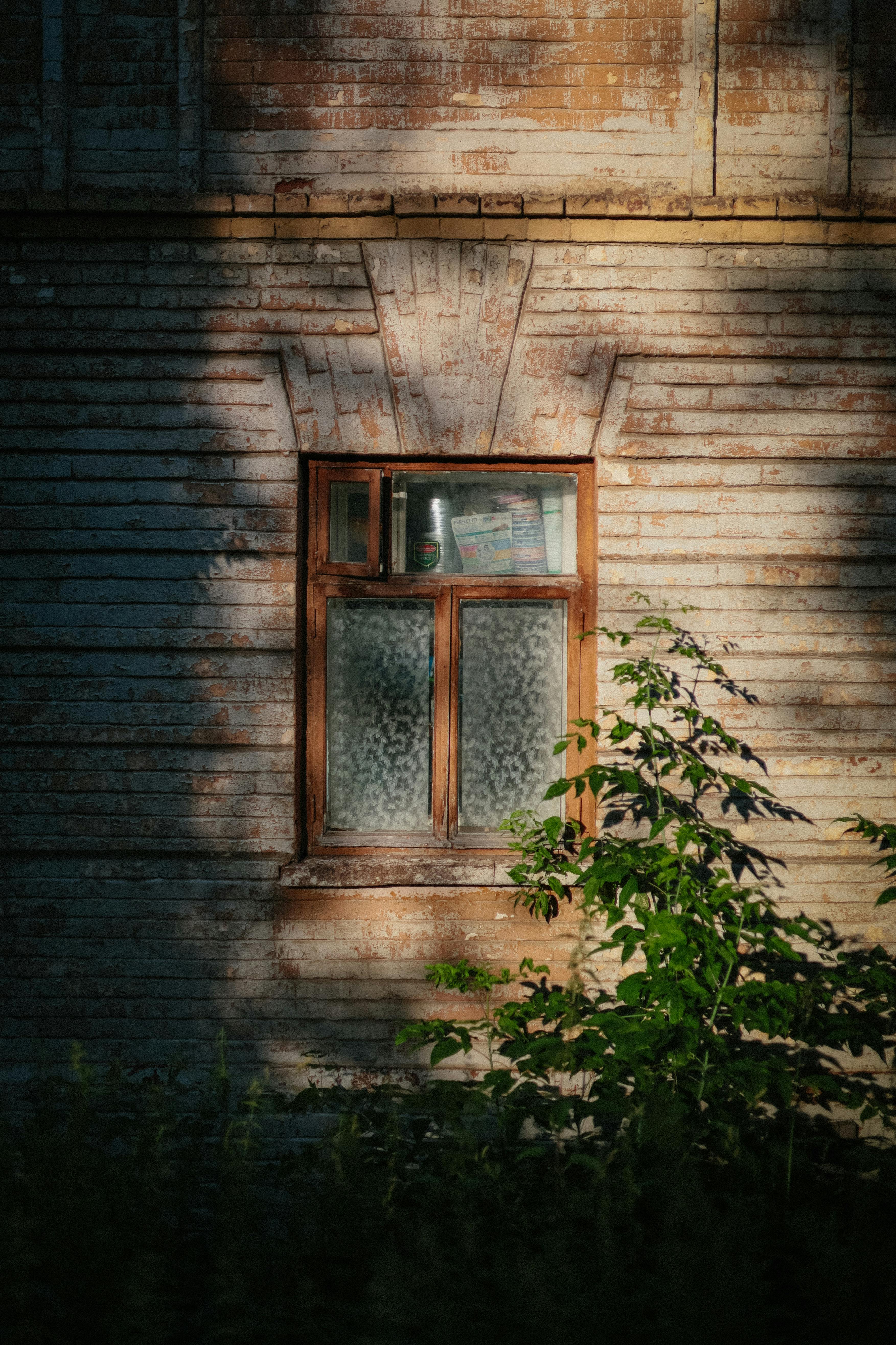 Rustic Old Building Window with Shadow Play · Free Stock Photo