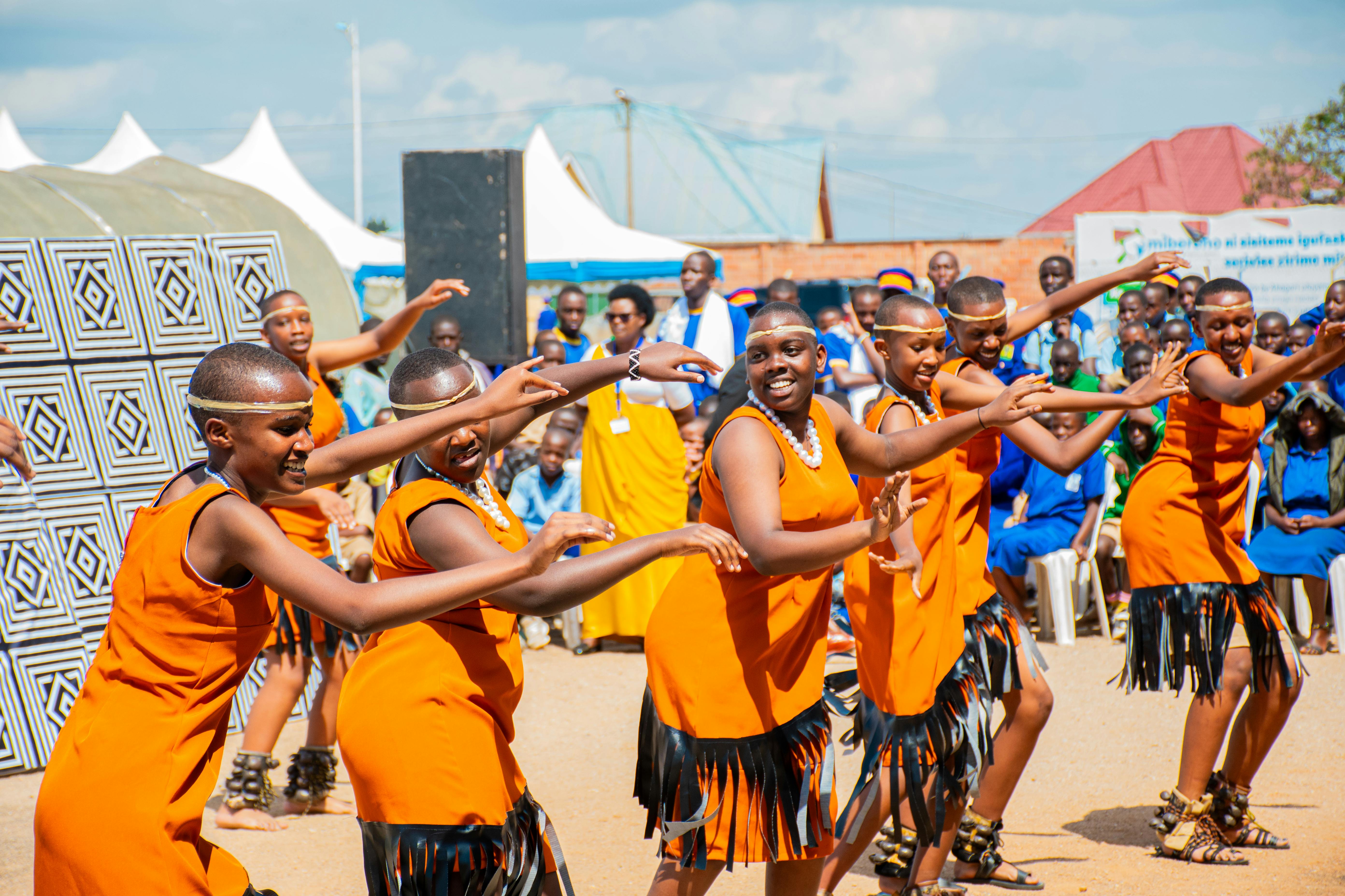 Vibrant African Traditional Dance Performance Outdoors · Free Stock Photo