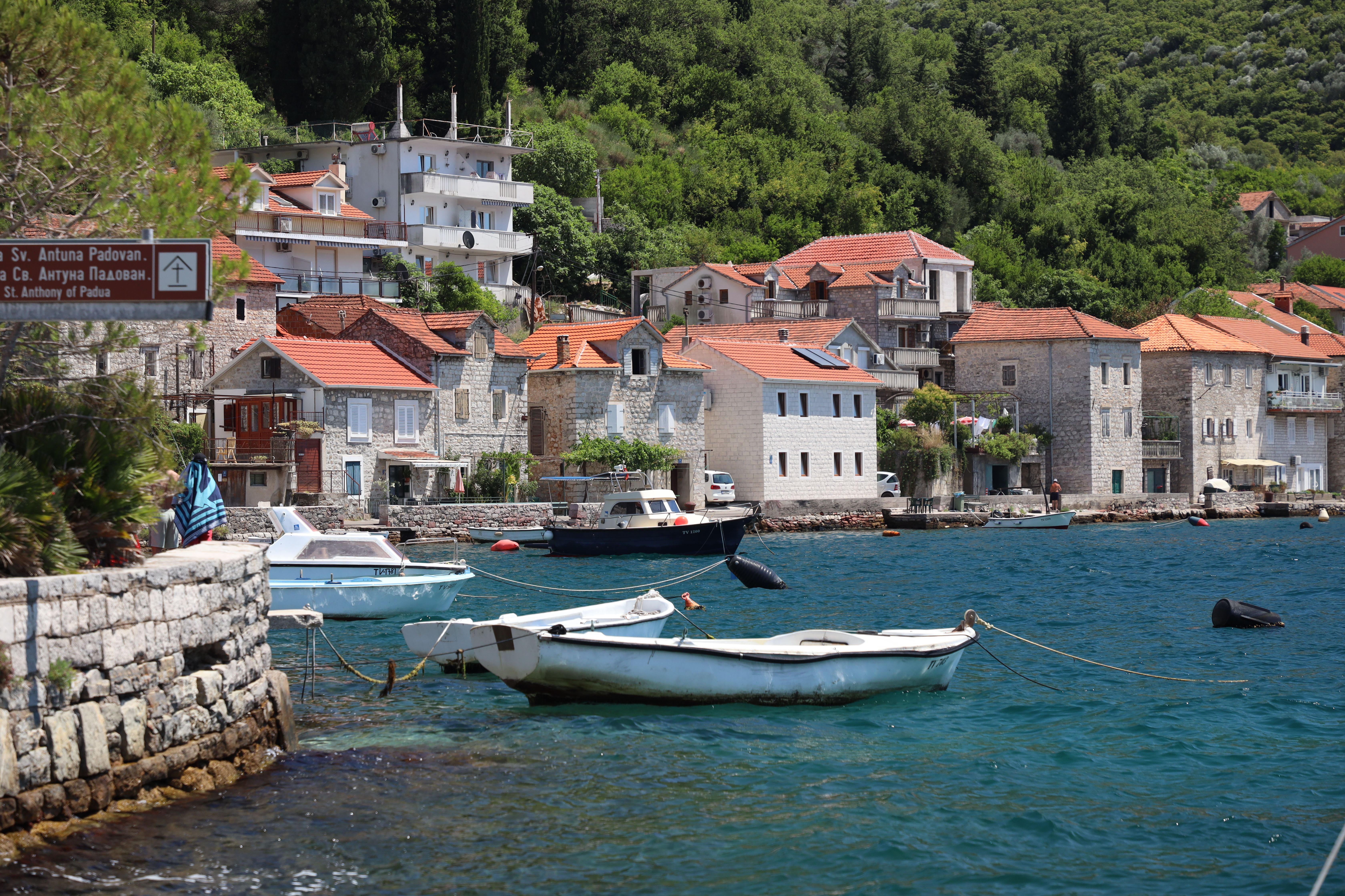 Charming Coastal Village with Boats and Stone Houses · Free Stock Photo