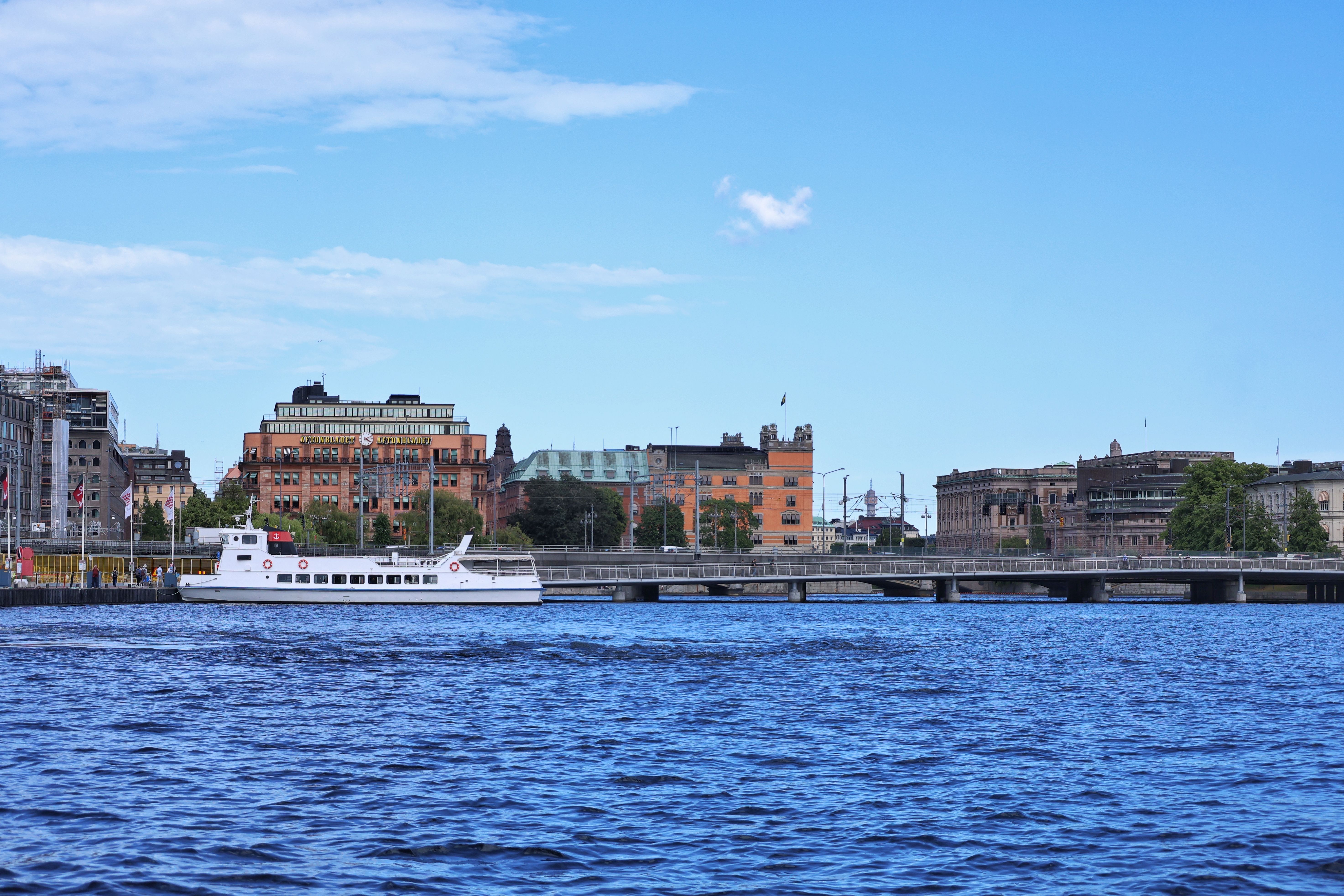 Scenic View of Stockholm's Waterfront with a Passenger Boat · Free ...