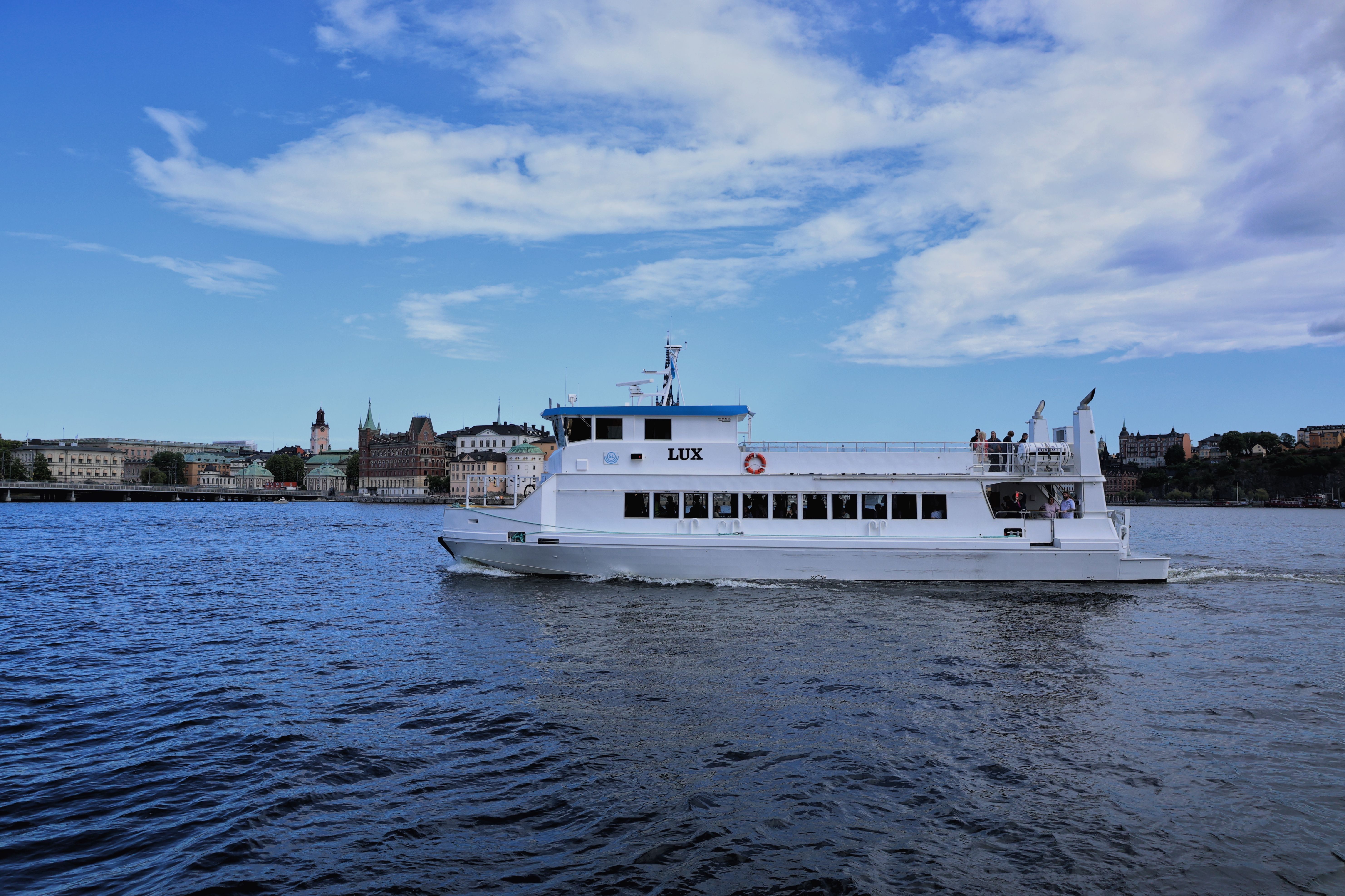 Lux Passenger Boat on Blue Waters in Stockholm · Free Stock Photo
