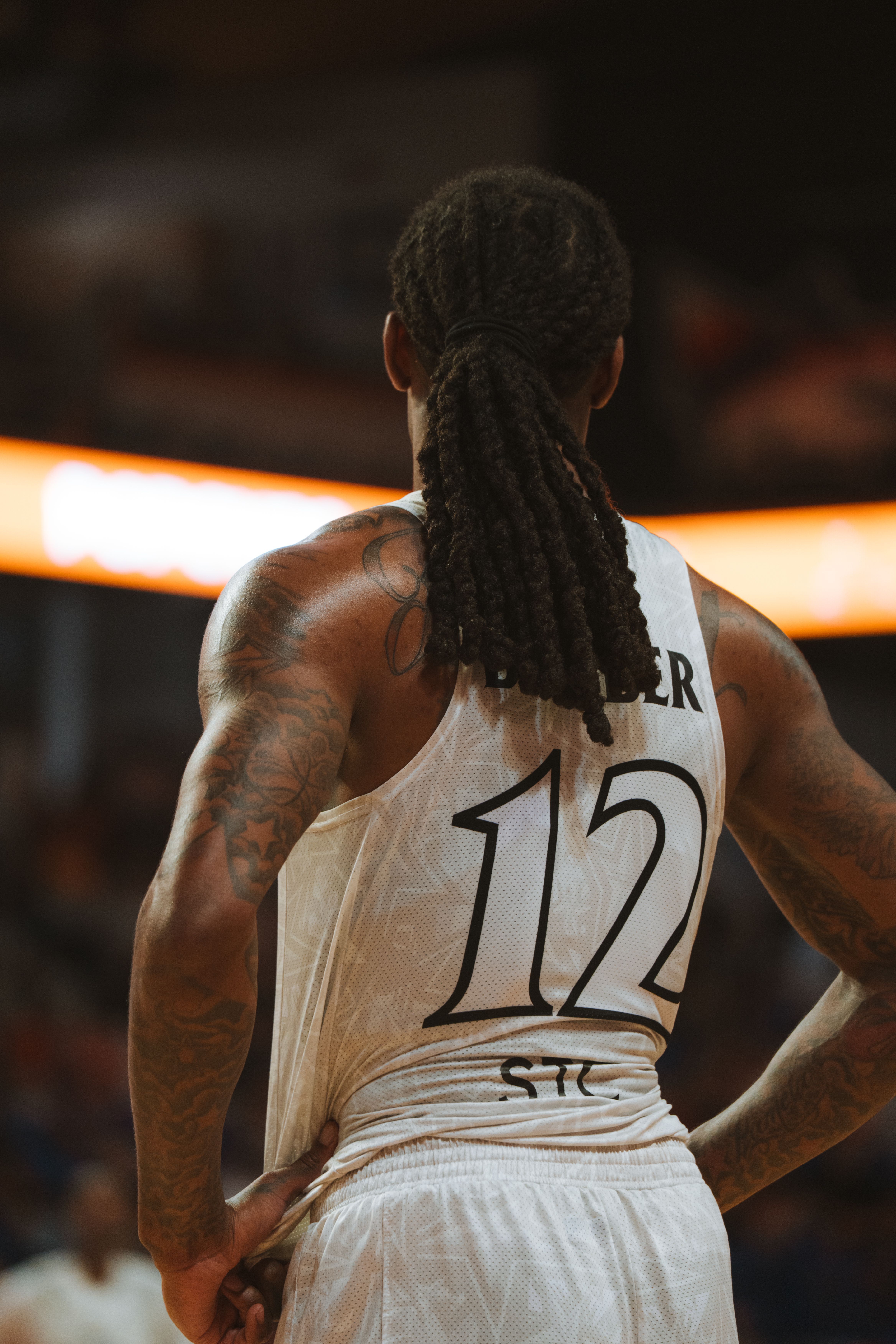 Rear View of Basketball Player in Action · Free Stock Photo
