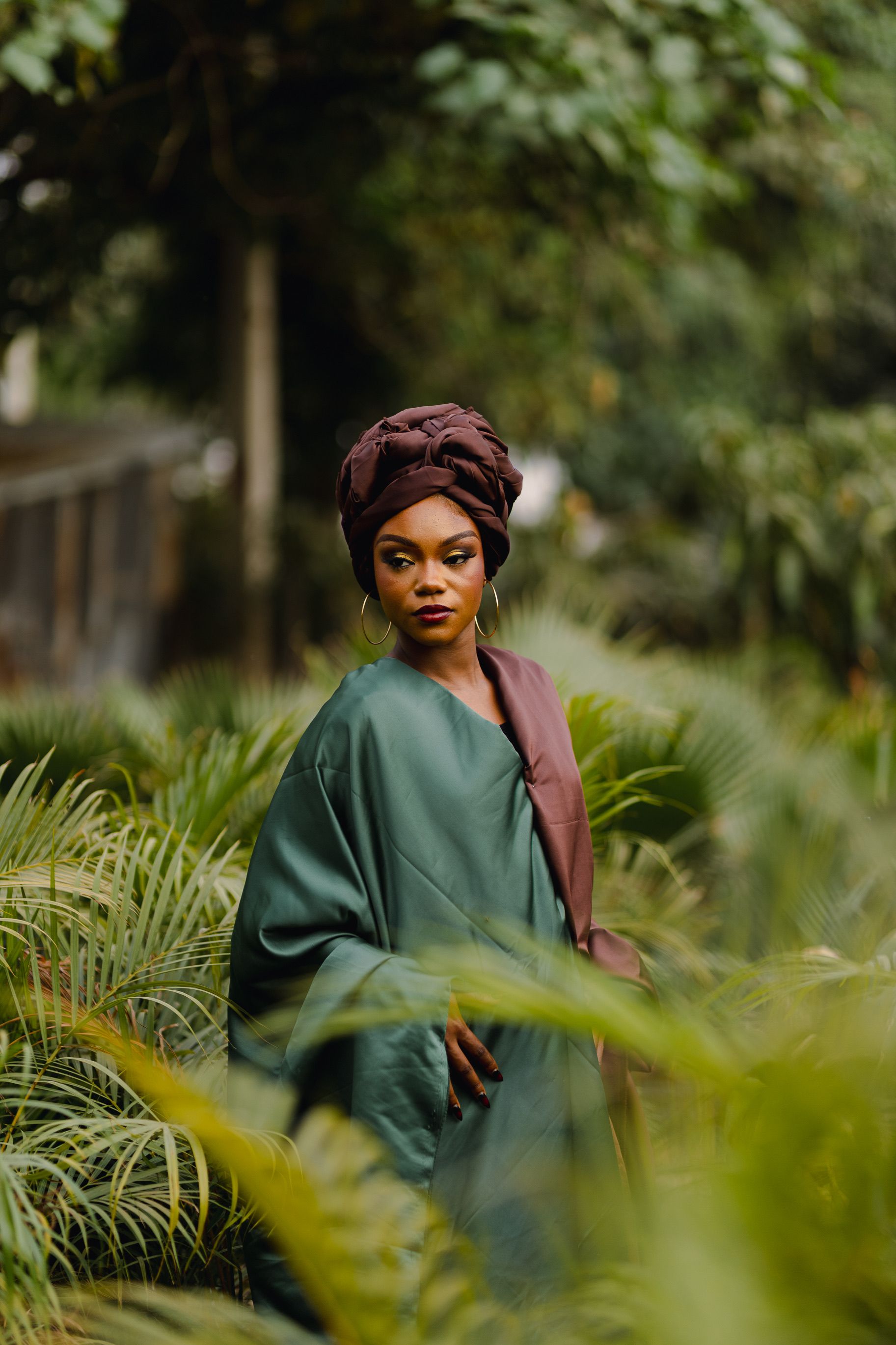 Elegant Woman in Forest Wearing Traditional Attire · Free Stock Photo