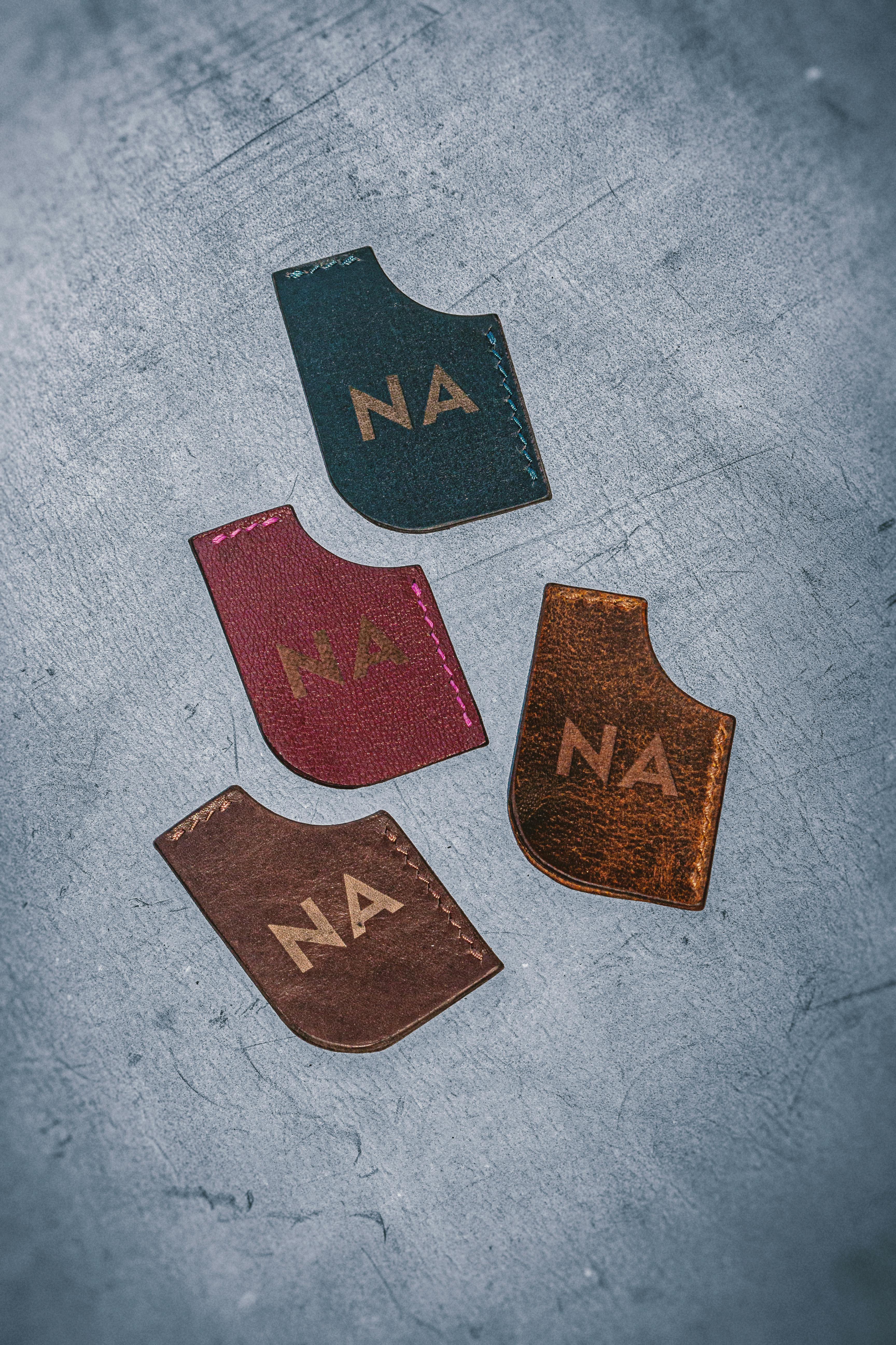 Elegant Handmade Leather Bookmarks with Initials NA · Free Stock Photo