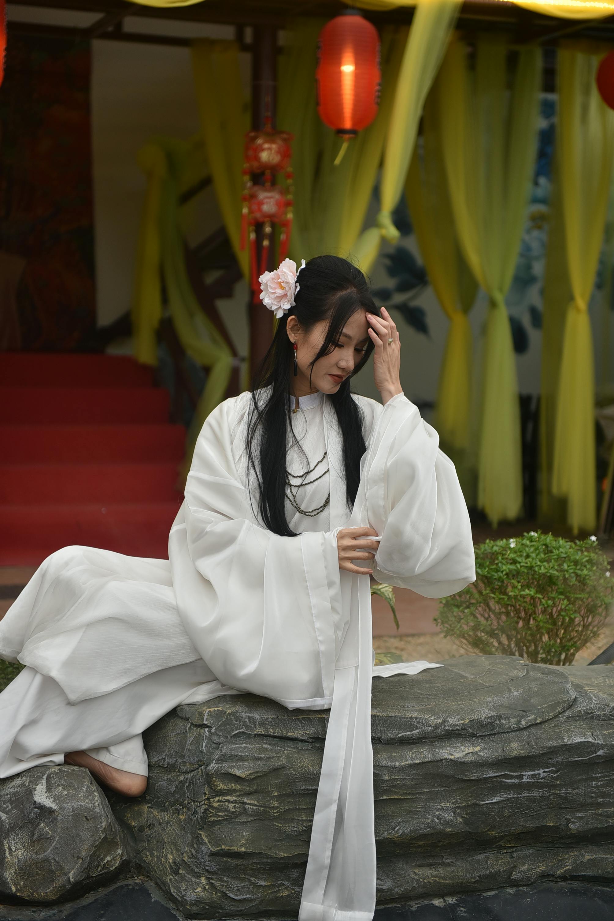 Traditional Asian Woman in Cultural Attire · Free Stock Photo