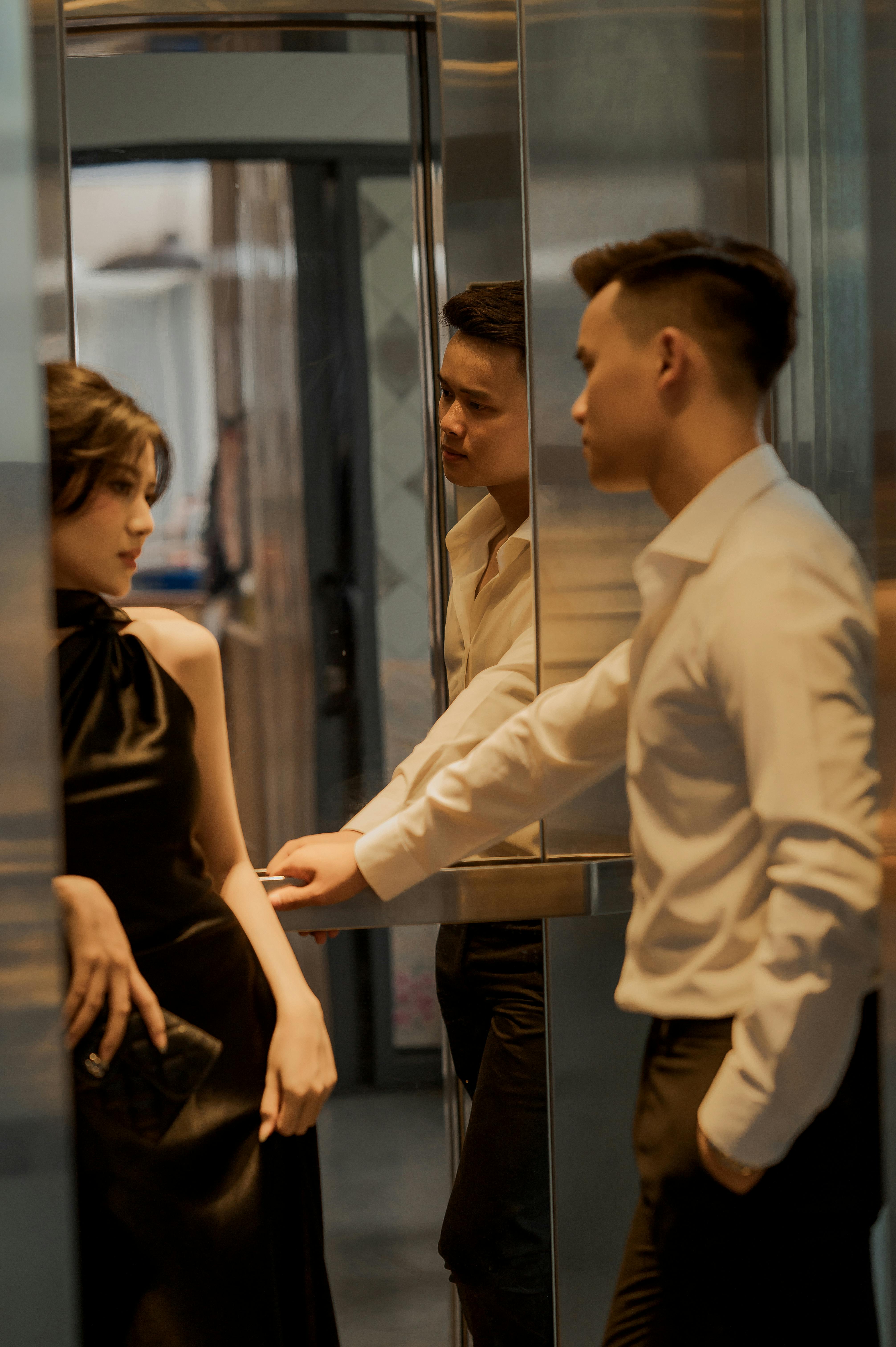 Elegant Elevator Interaction in Hanoi, Vietnam · Free Stock Photo