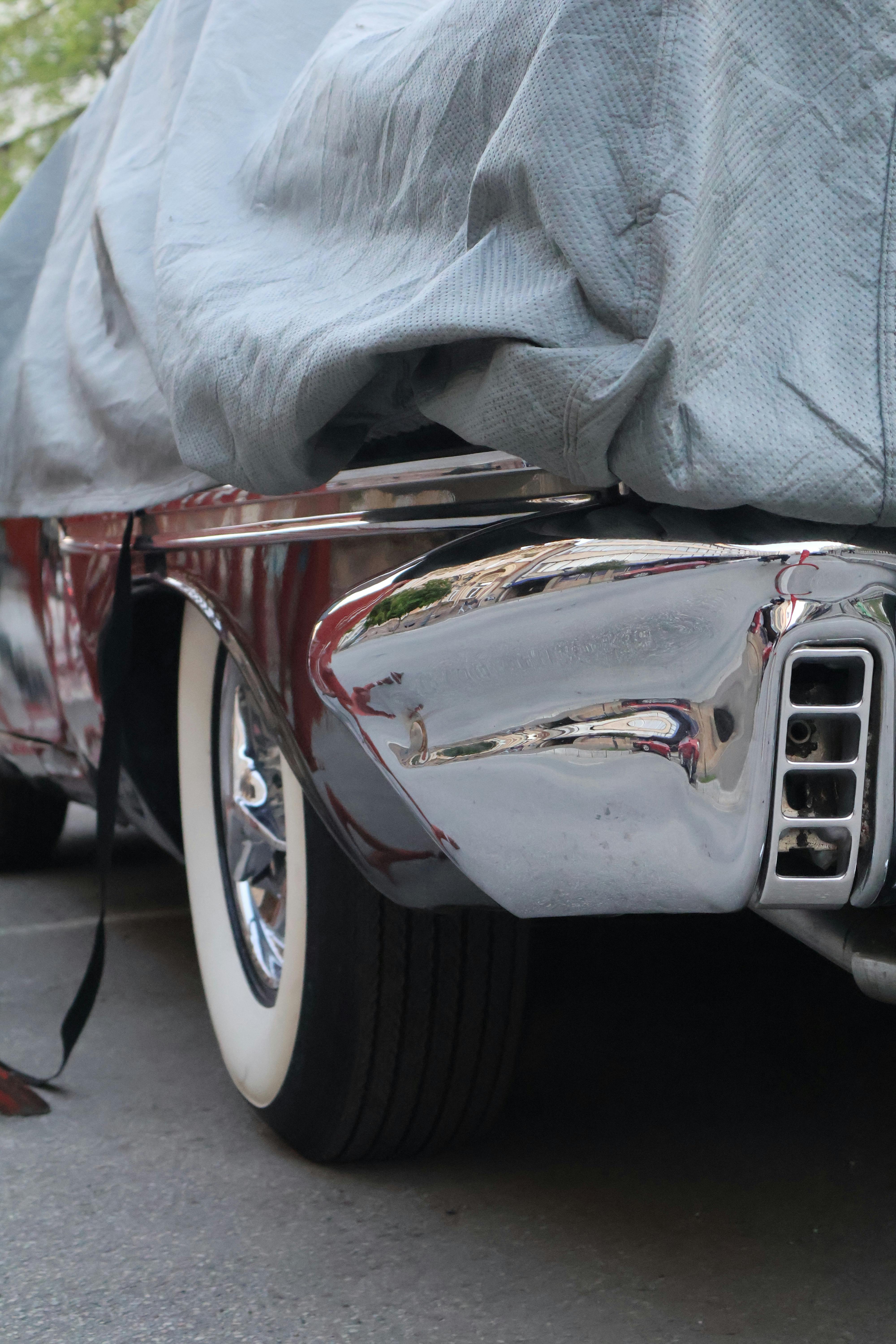 Vintage Car Covered in a Protective Tarp · Free Stock Photo