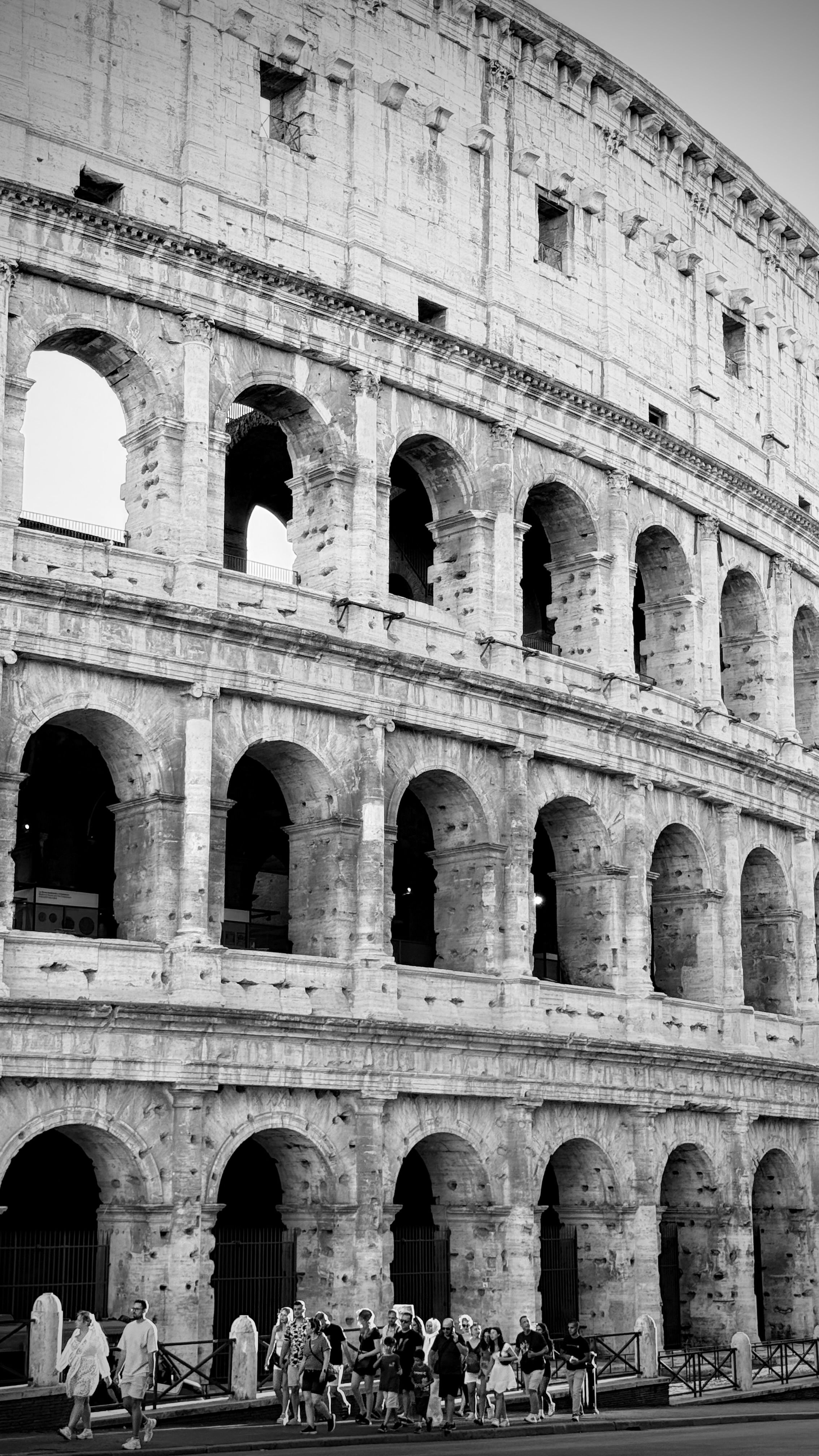 Black and White Colosseum in Rome Bustling with Tourists · Free Stock Photo