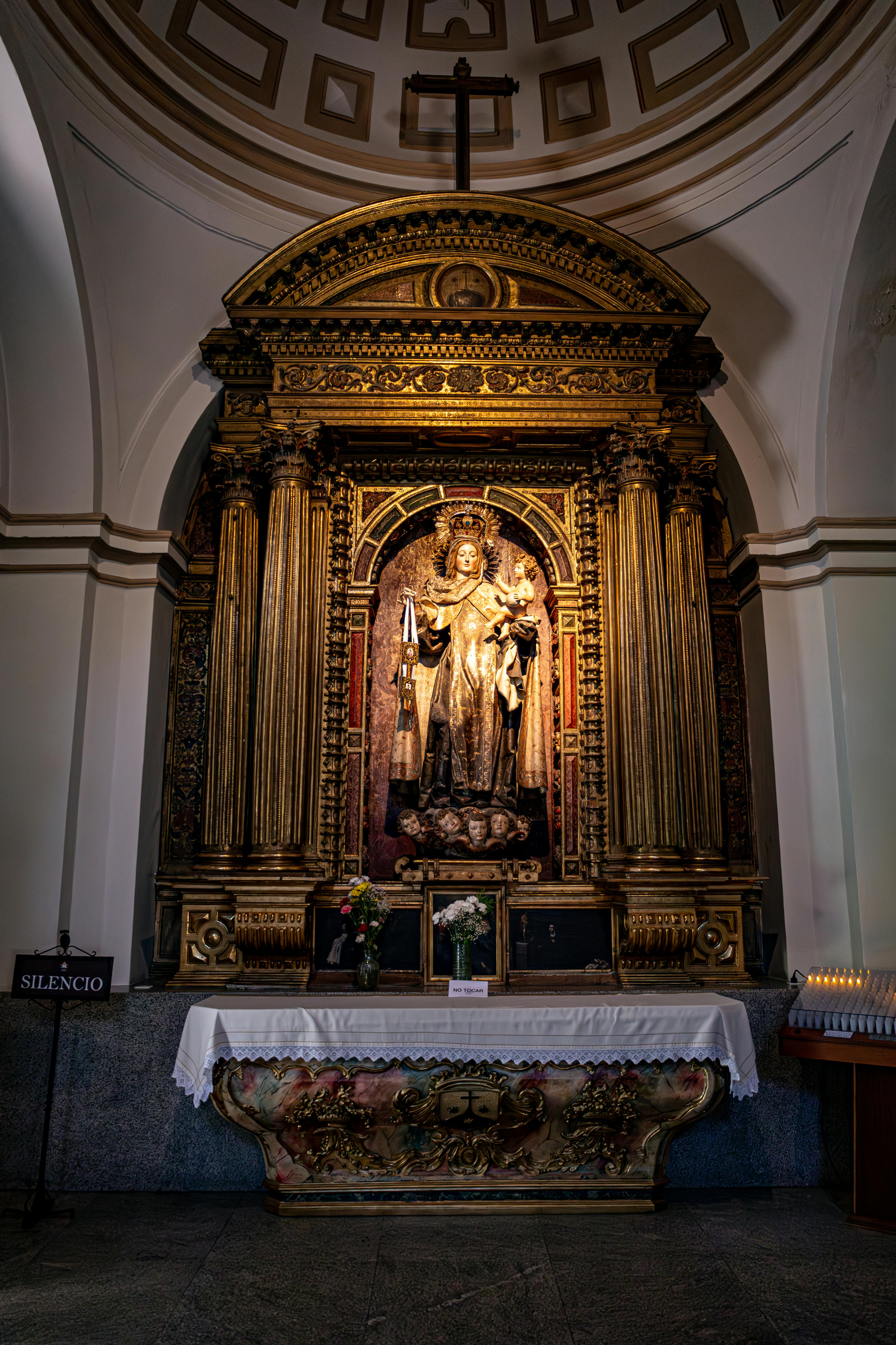 Intricate Church Altar with Religious Statues · Free Stock Photo