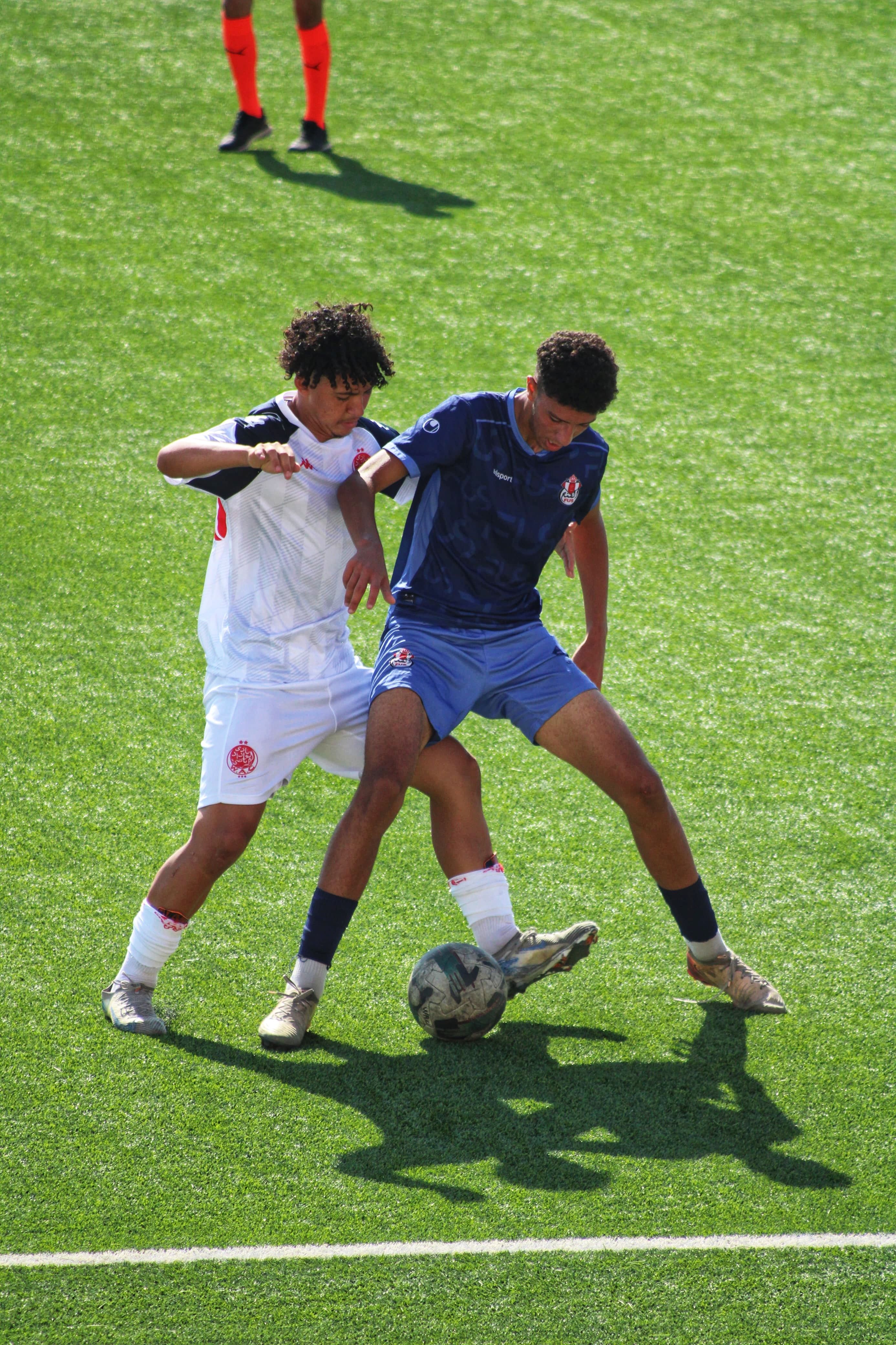Competitive Soccer Match Action on Field · Free Stock Photo