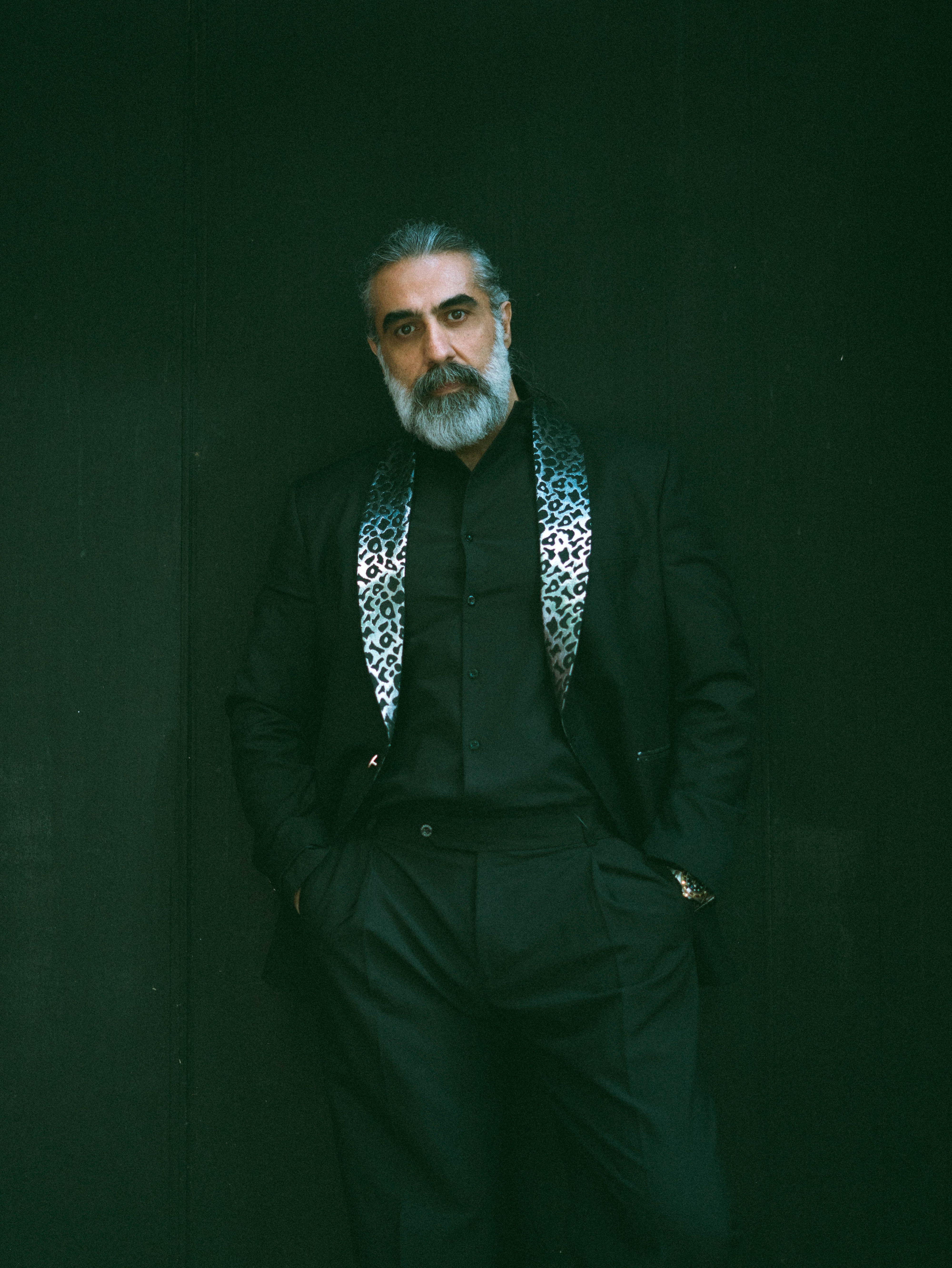 Sophisticated Portrait of Bearded Man in Black Suit · Free Stock Photo