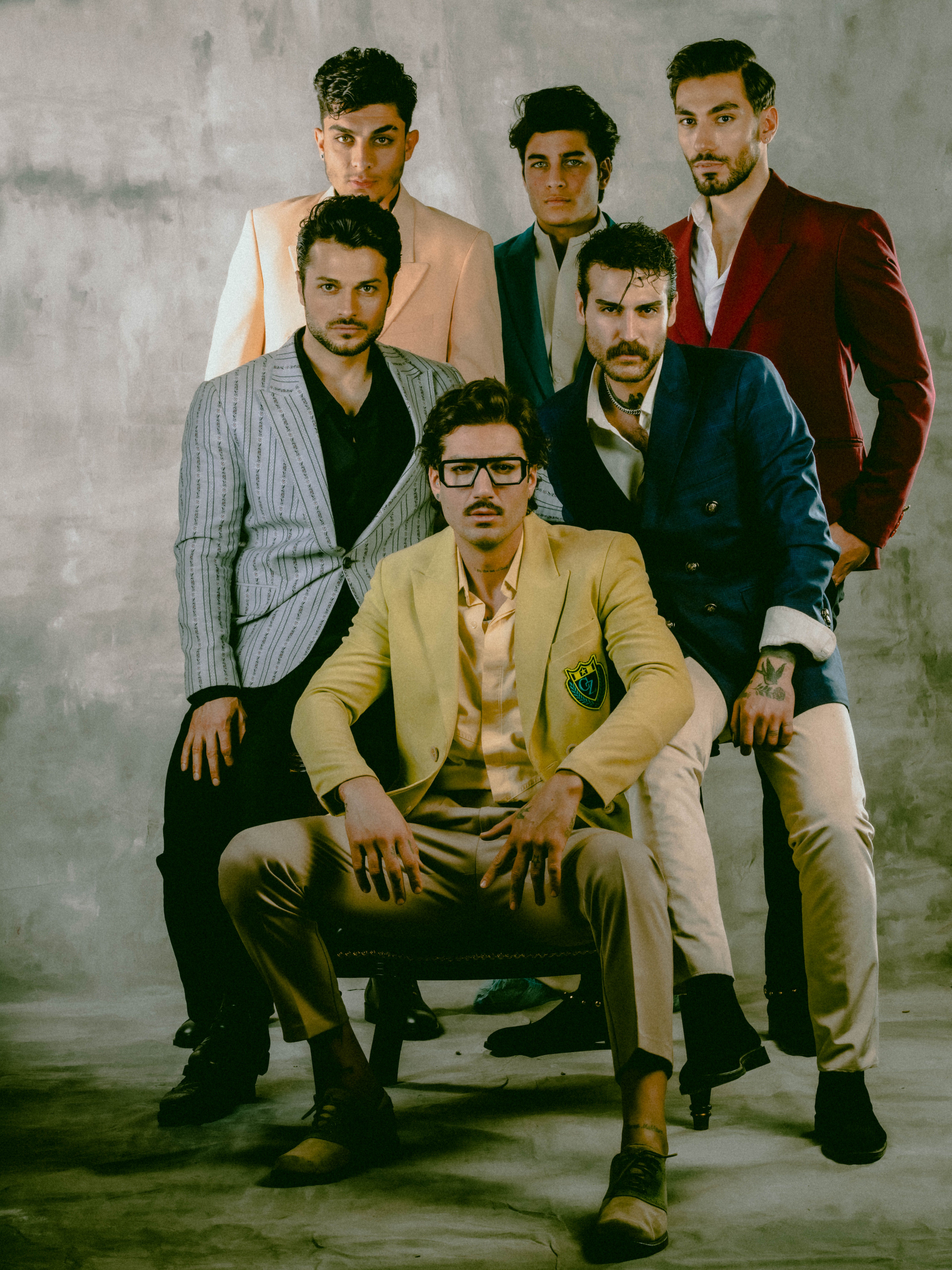Stylish Group Portrait of Fashionable Men · Free Stock Photo