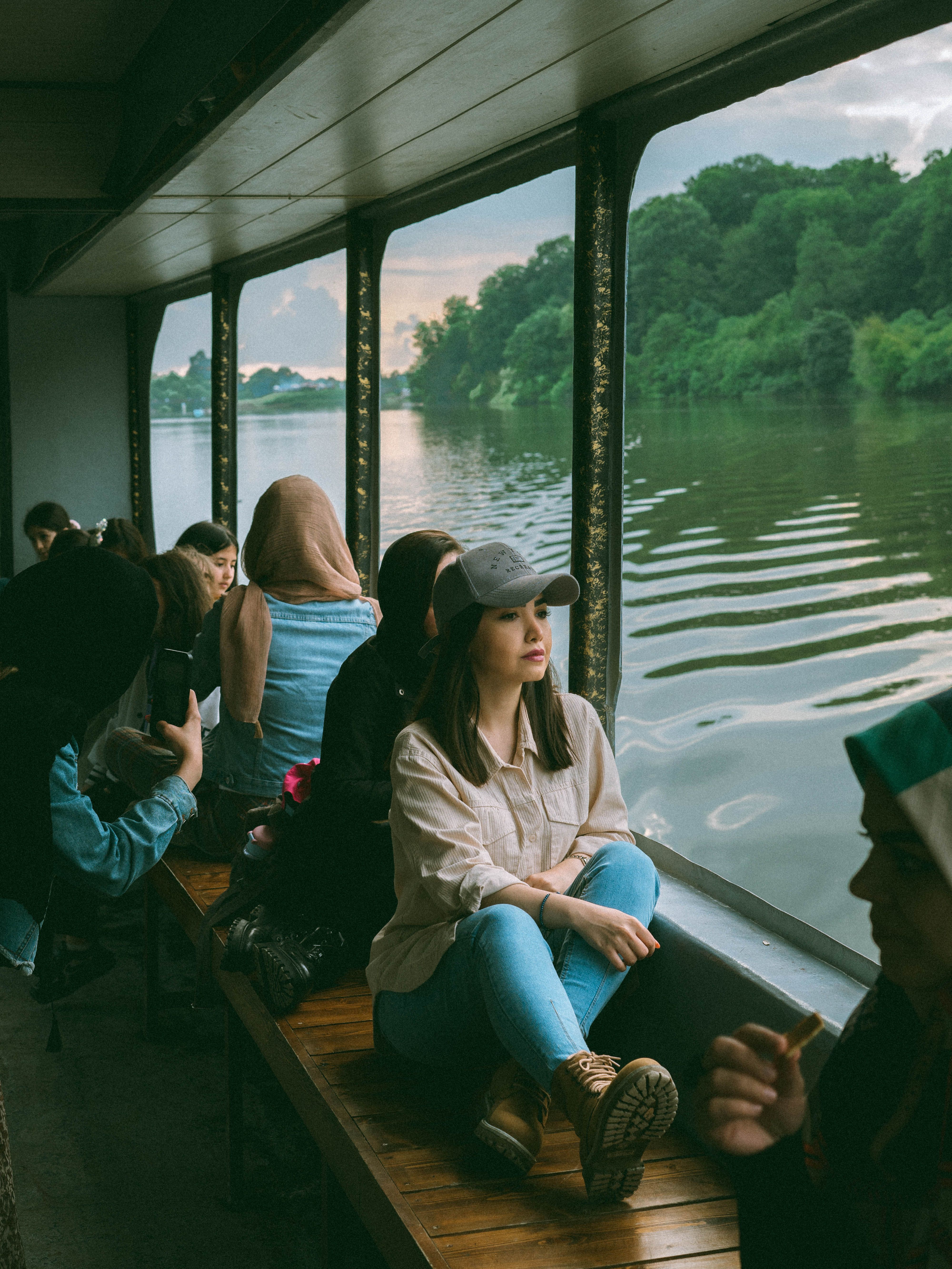 Scenic Boat Ride with Passengers Relaxing · Free Stock Photo
