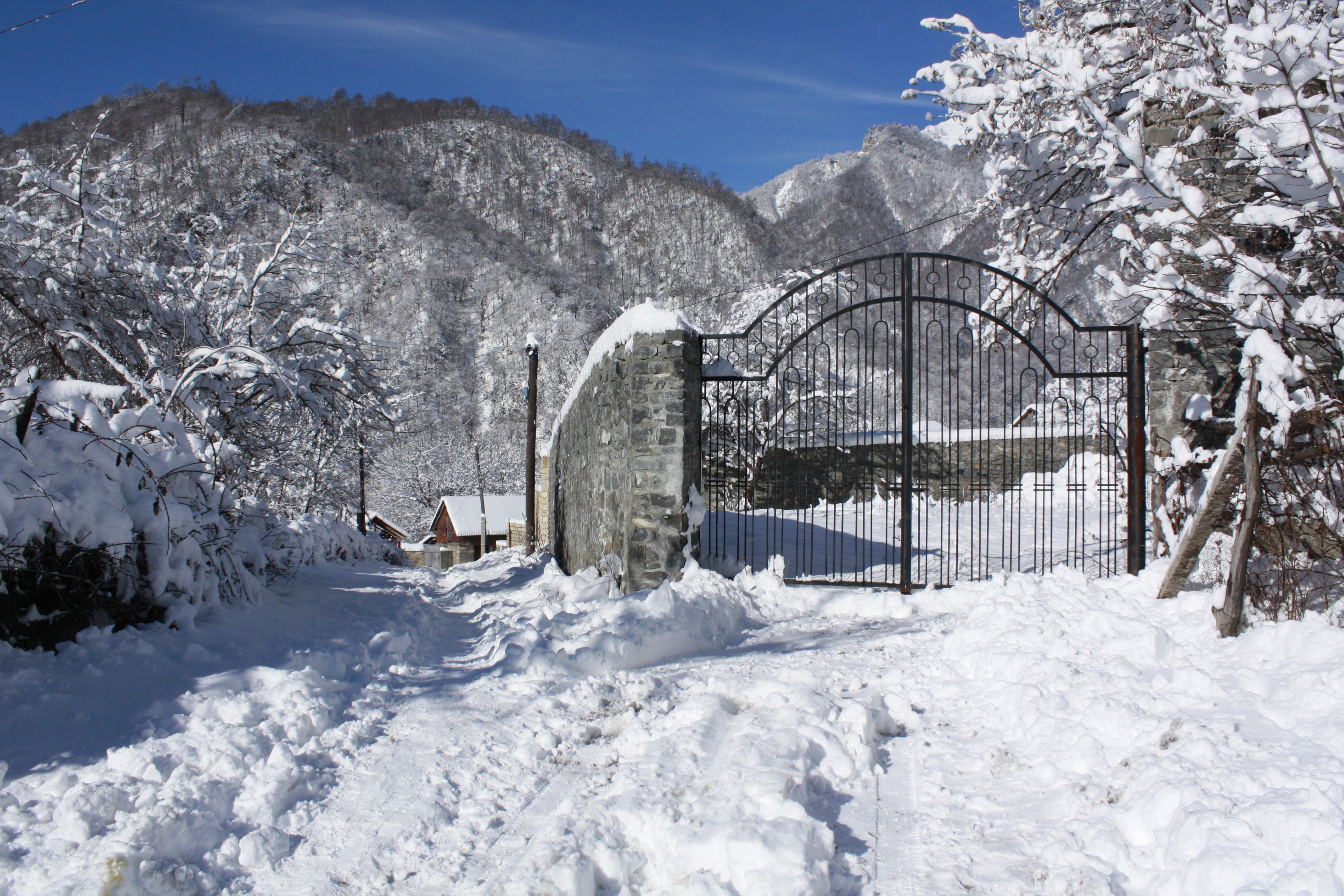 Winter Mountain Landscape with Snowy Gate · Free Stock Photo