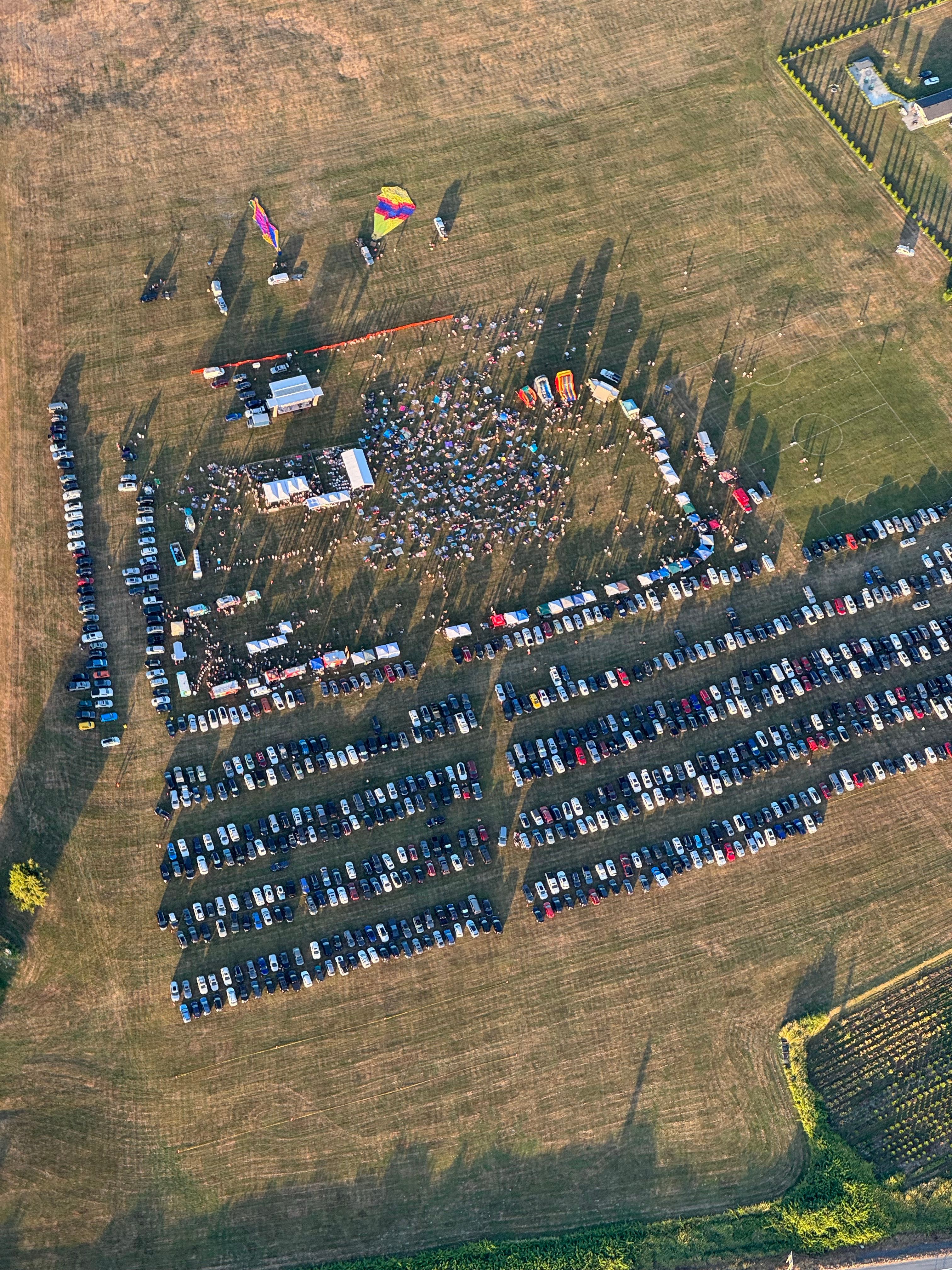 Aerial View of Outdoor Music Festival and Parking Lot · Free Stock Photo
