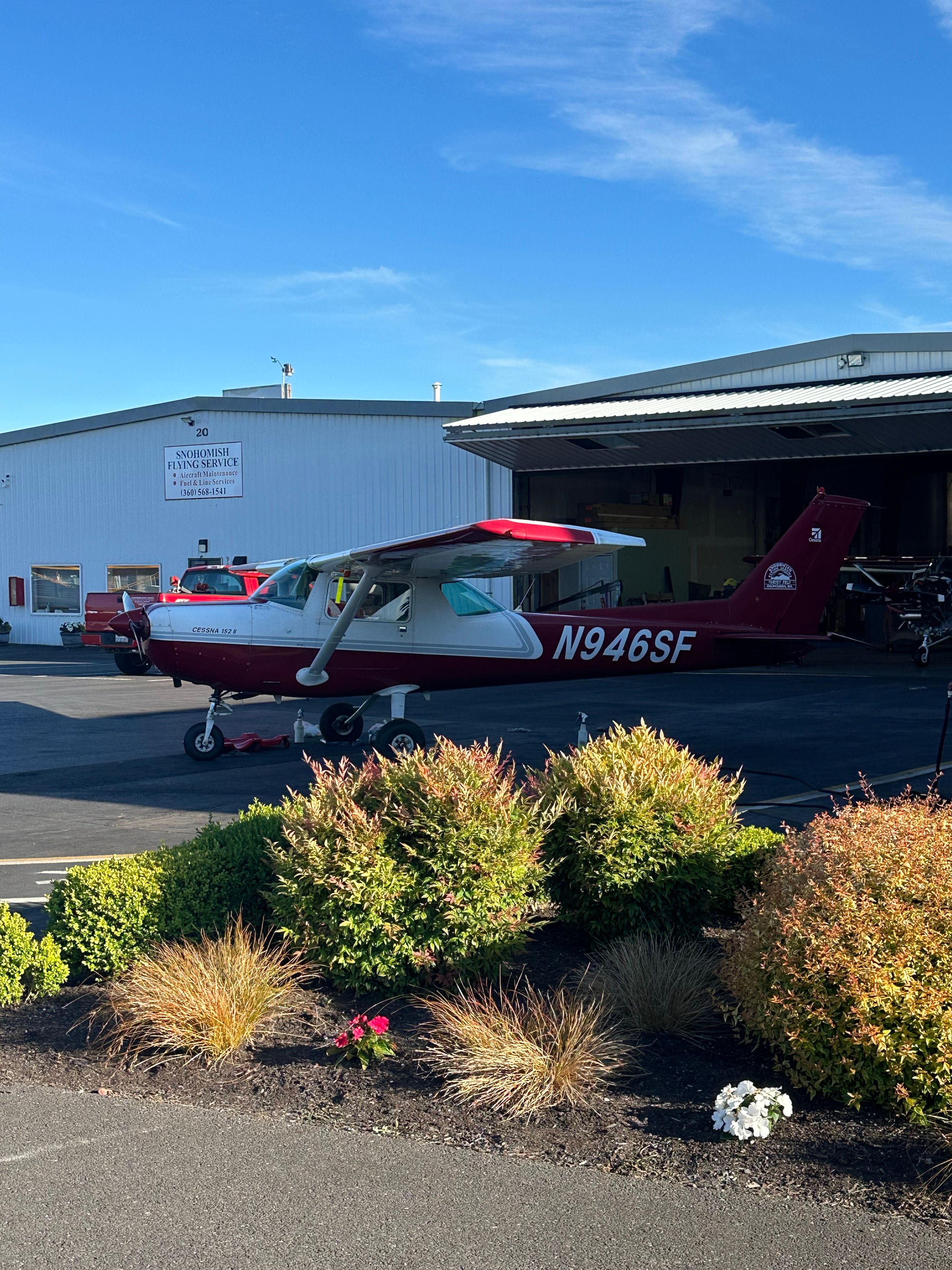 Small Private Plane Outside an Aircraft Hangar · Free Stock Photo