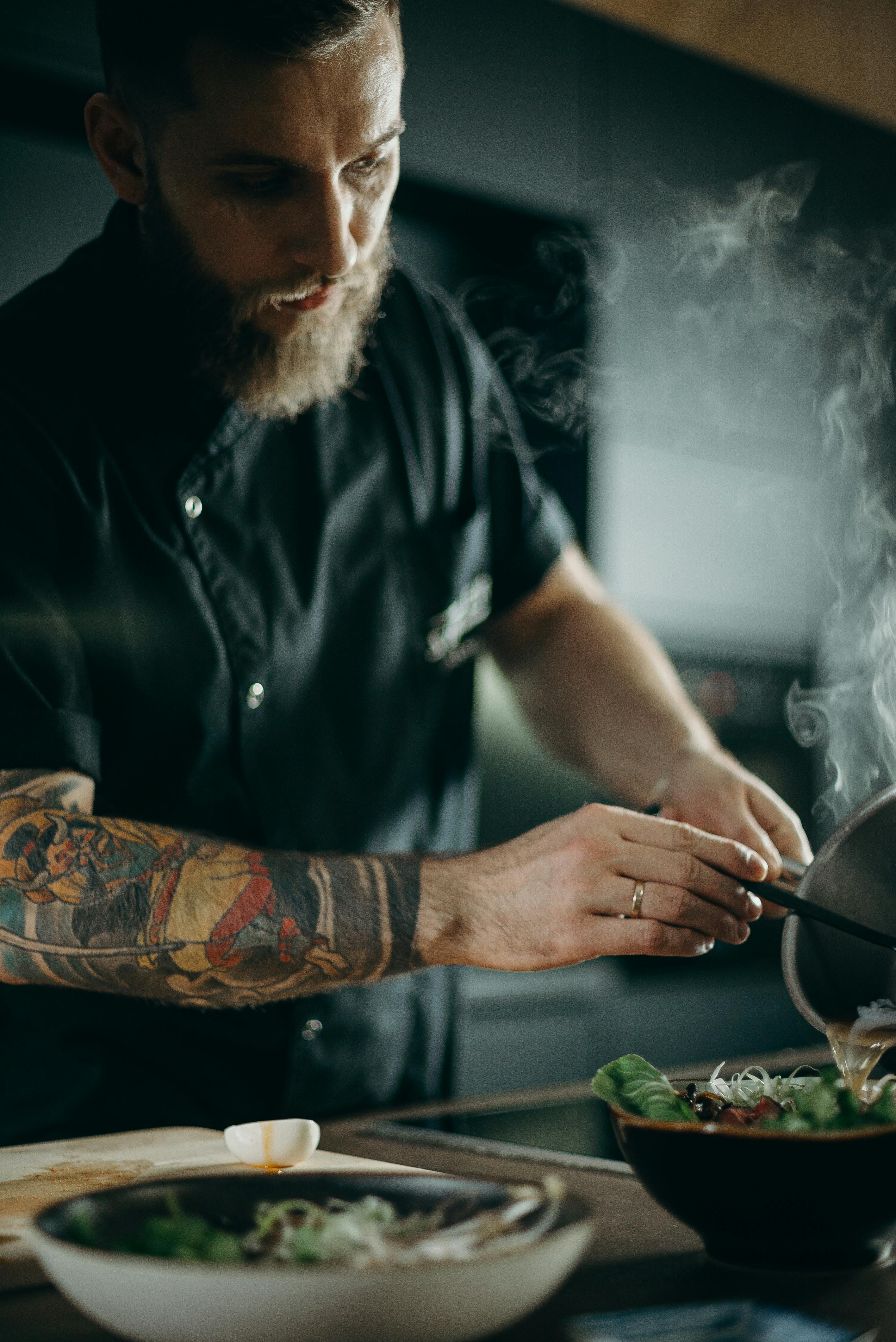 Man Pouring Soup in Bowl · Free Stock Photo