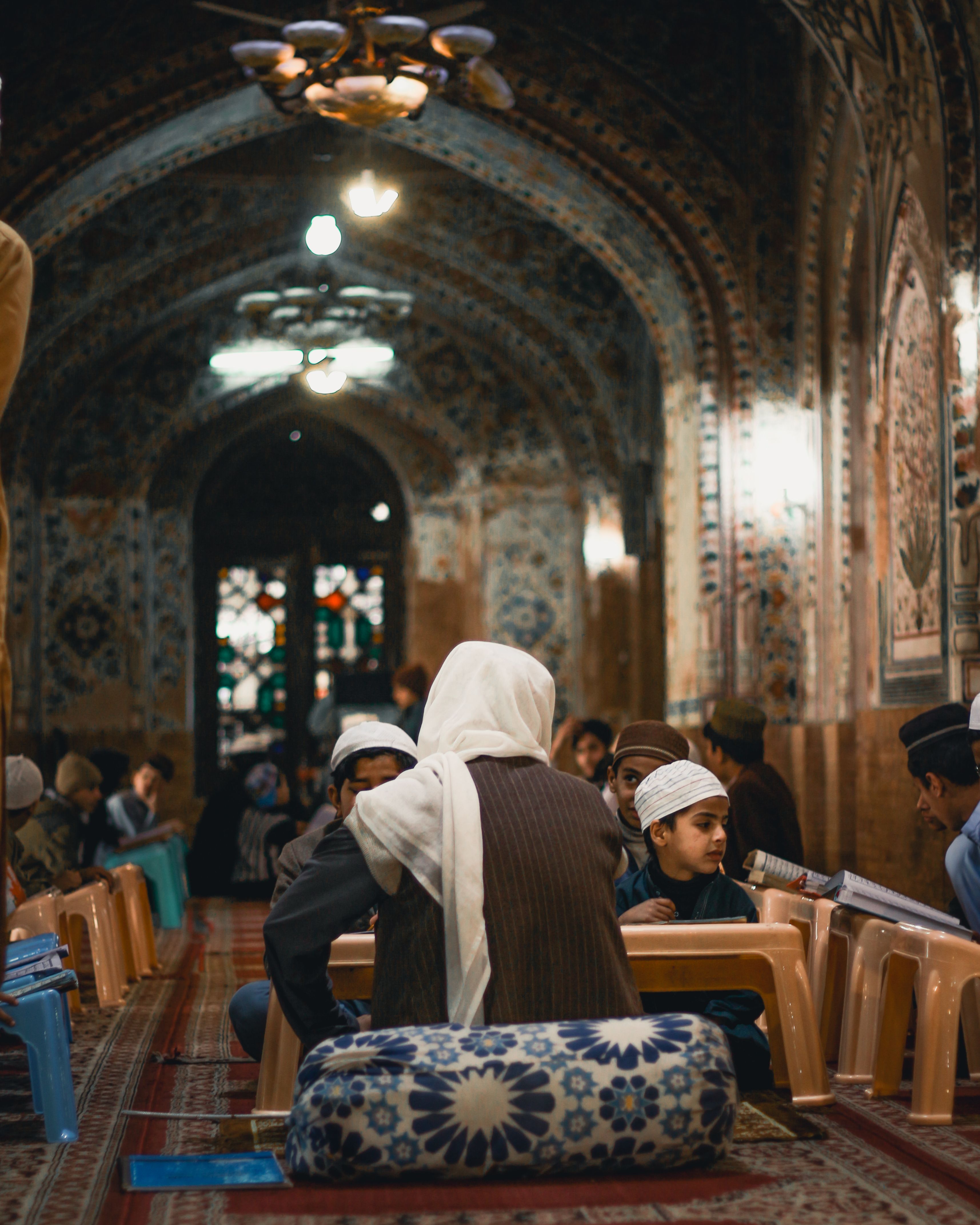 Traditional Islamic Study in Pakistani Mosque Interior · Free Stock Photo