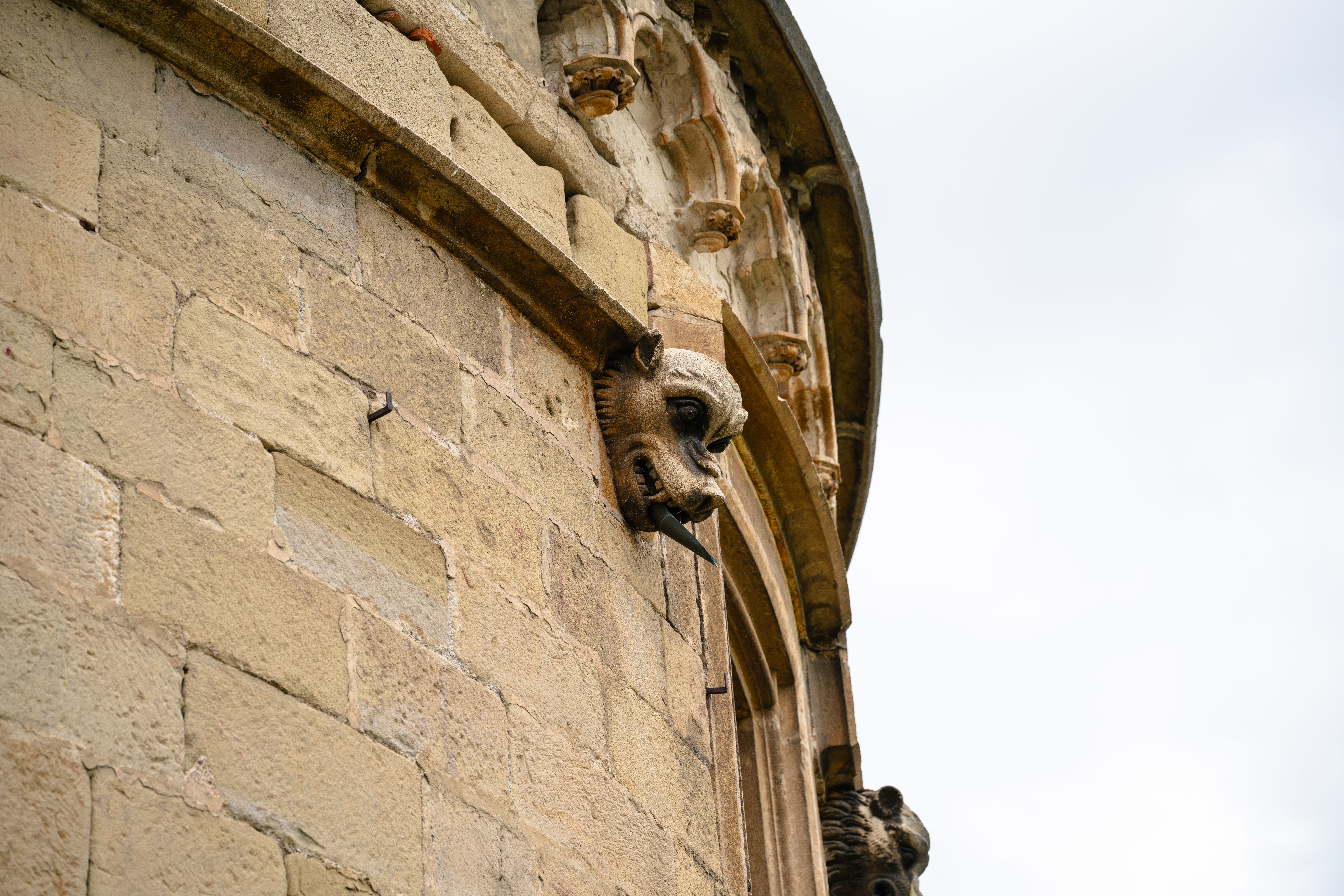 Gothic Gargoyle on Medieval Castle Wall · Free Stock Photo