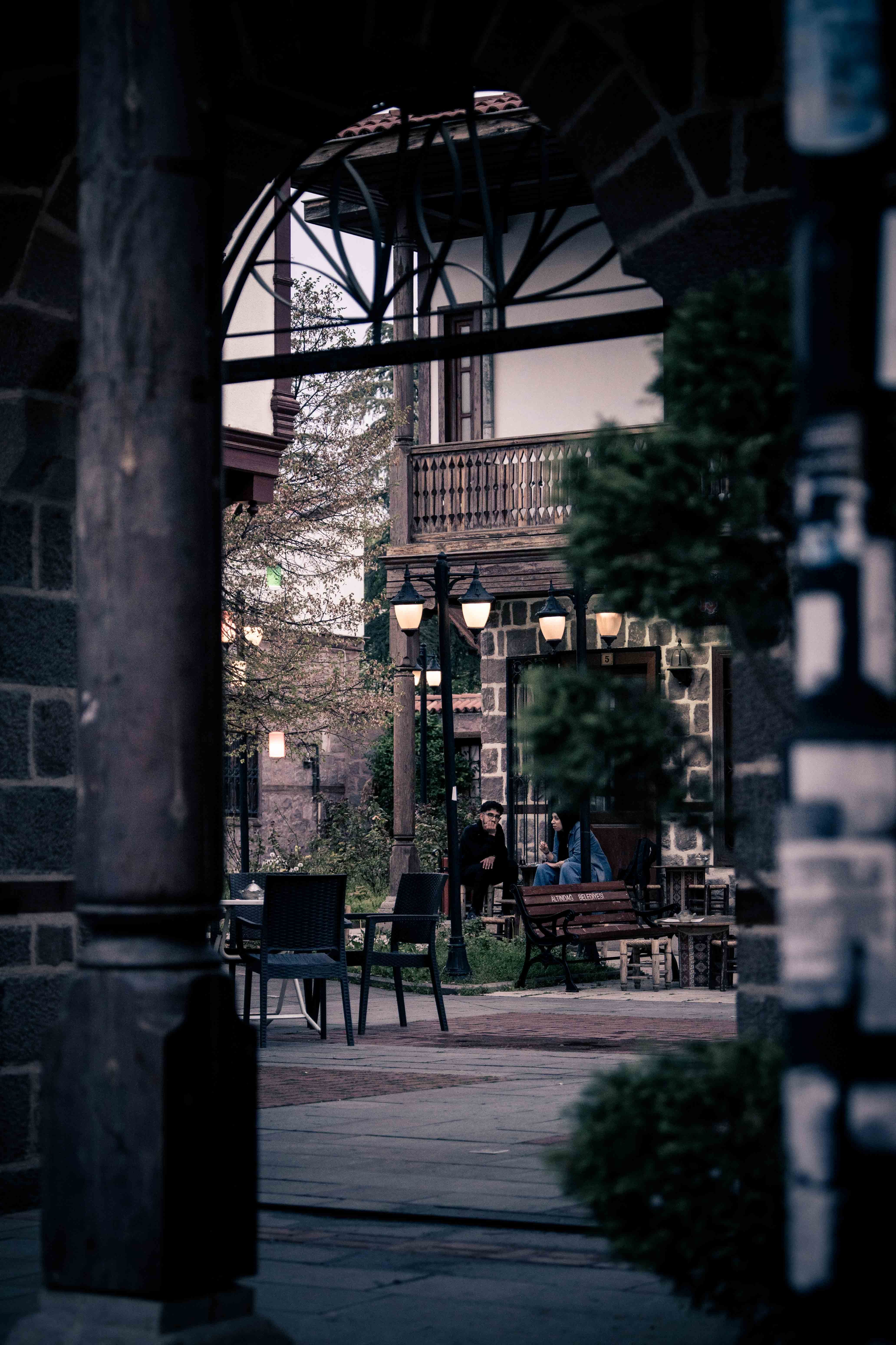 Charming Outdoor Café in Historic European Setting · Free Stock Photo