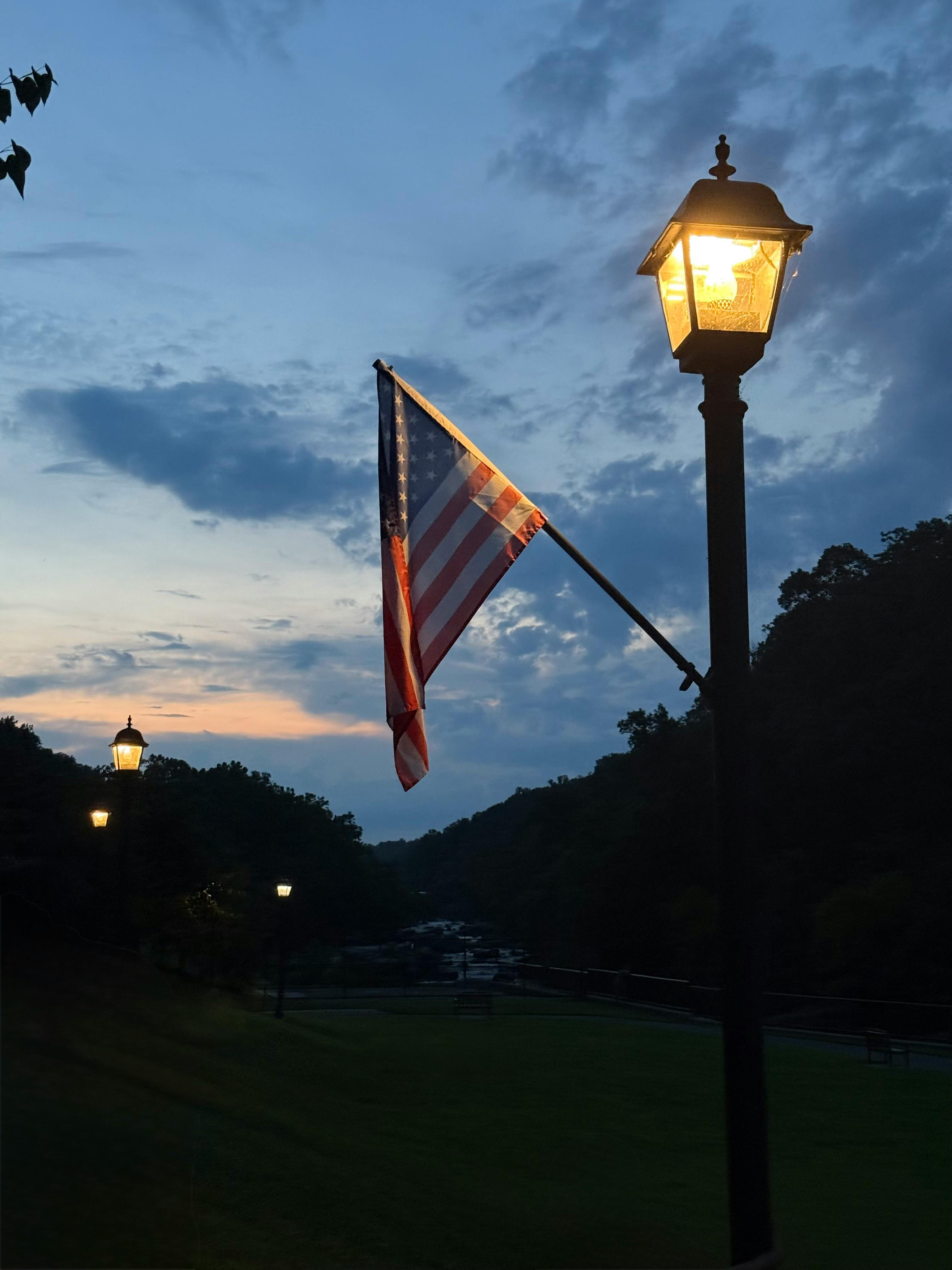 American Flag and Streetlights at Twilight in Lorton, VA · Free Stock Photo