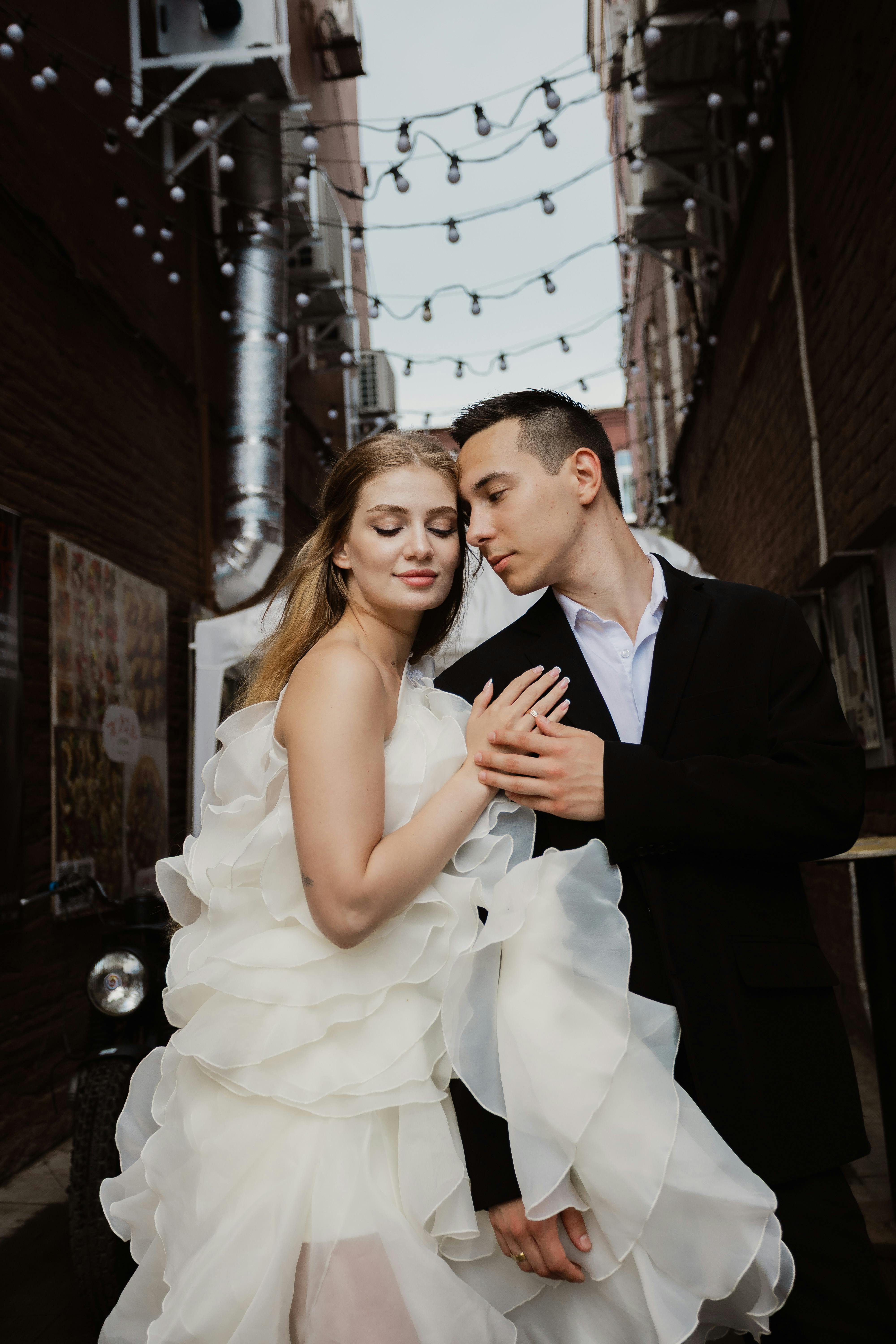Romantic Couple in Urban Alleyway Setting · Free Stock Photo