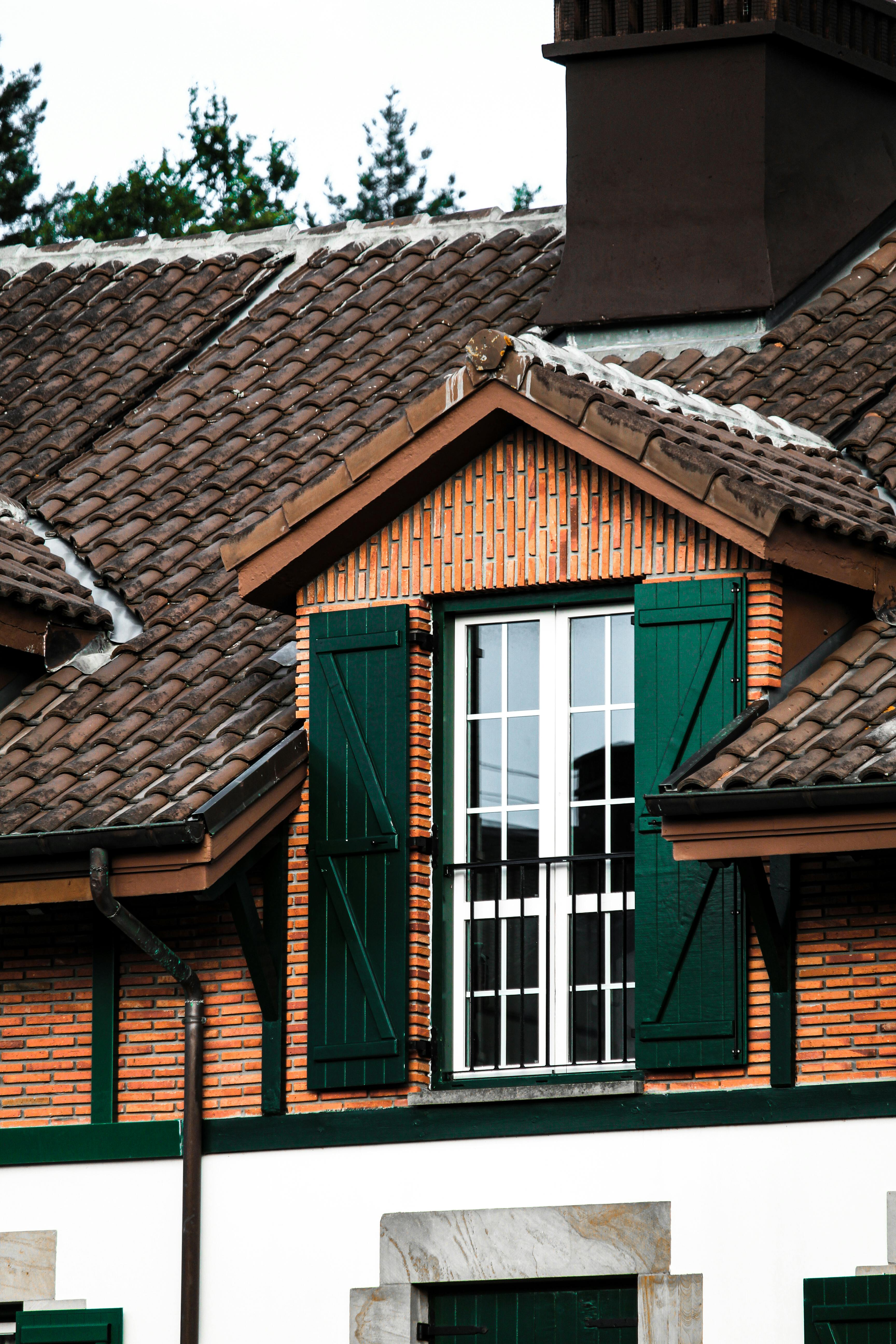 Traditional Basque Architecture with Green Shutters · Free Stock Photo