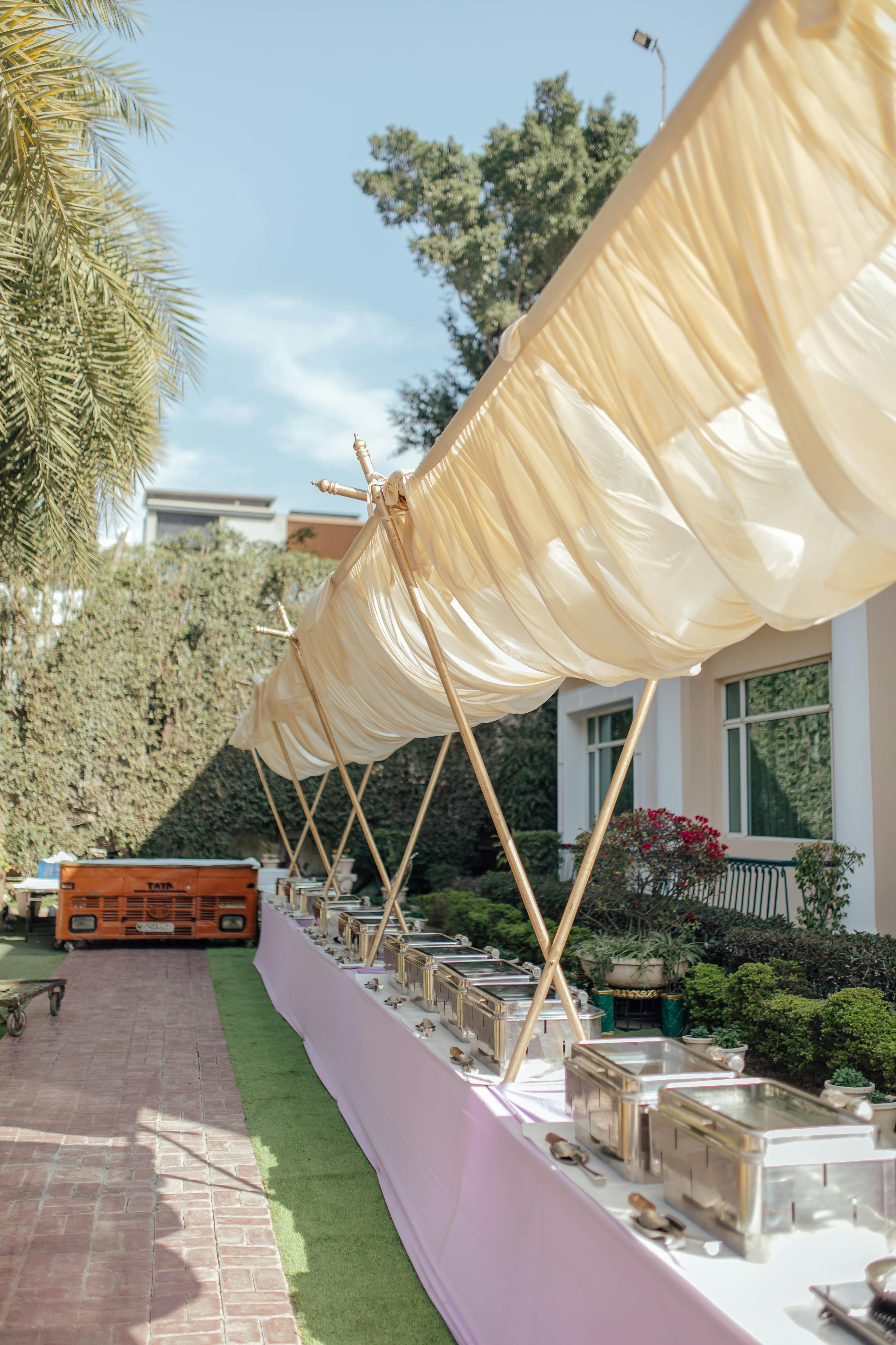 Elegant Outdoor Buffet Setup at Event Venue · Free Stock Photo